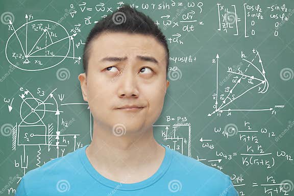 Confused Young Student in Front of Blackboard with Math Equations ...