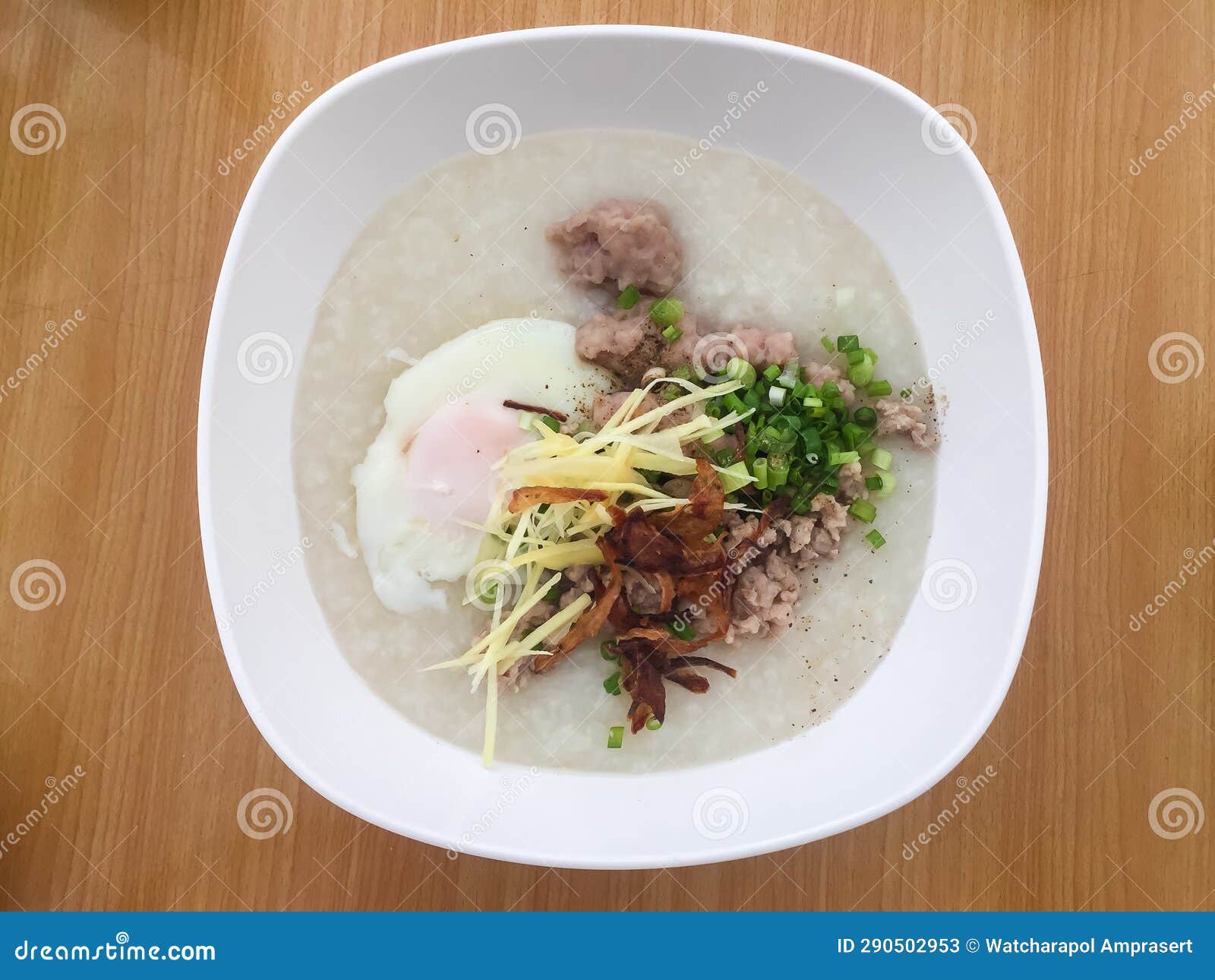 Congee with pork stock image. Image of rice, meal, spoon - 290502953