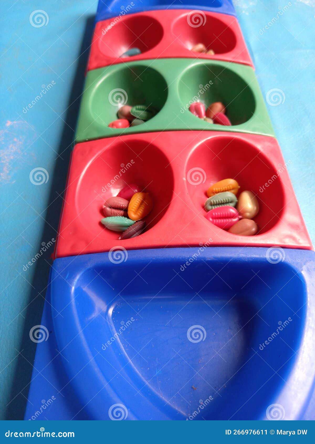 Congklak or Dakon stock image. Image of gadget, lighting - 266976611