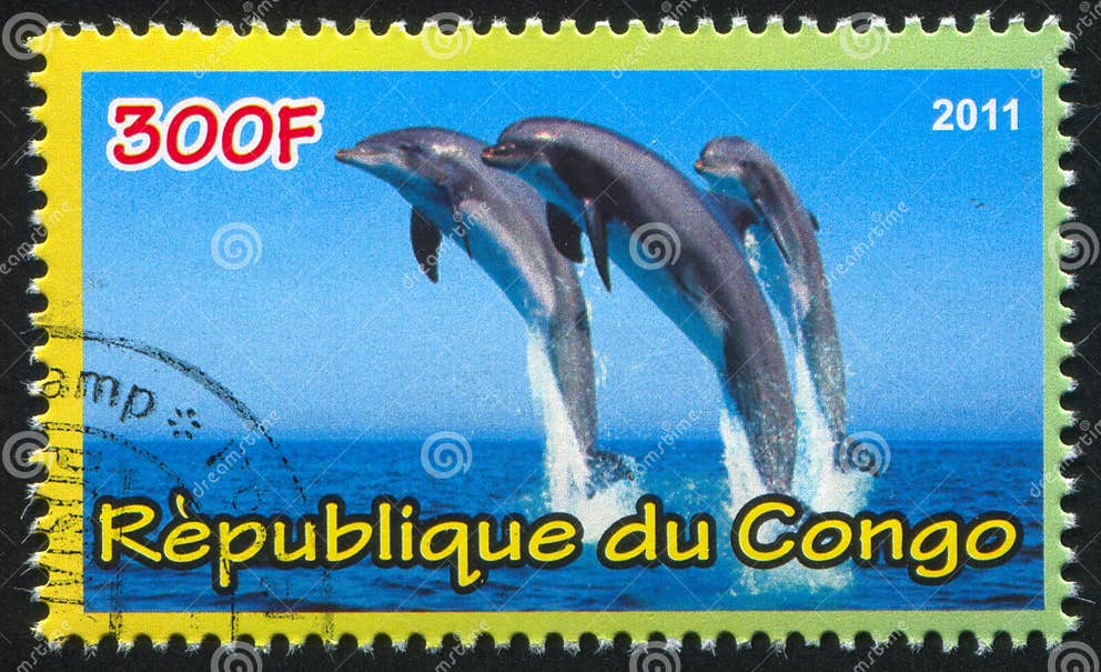 Dolphins printed by Congo editorial stock image. Image of antique ...