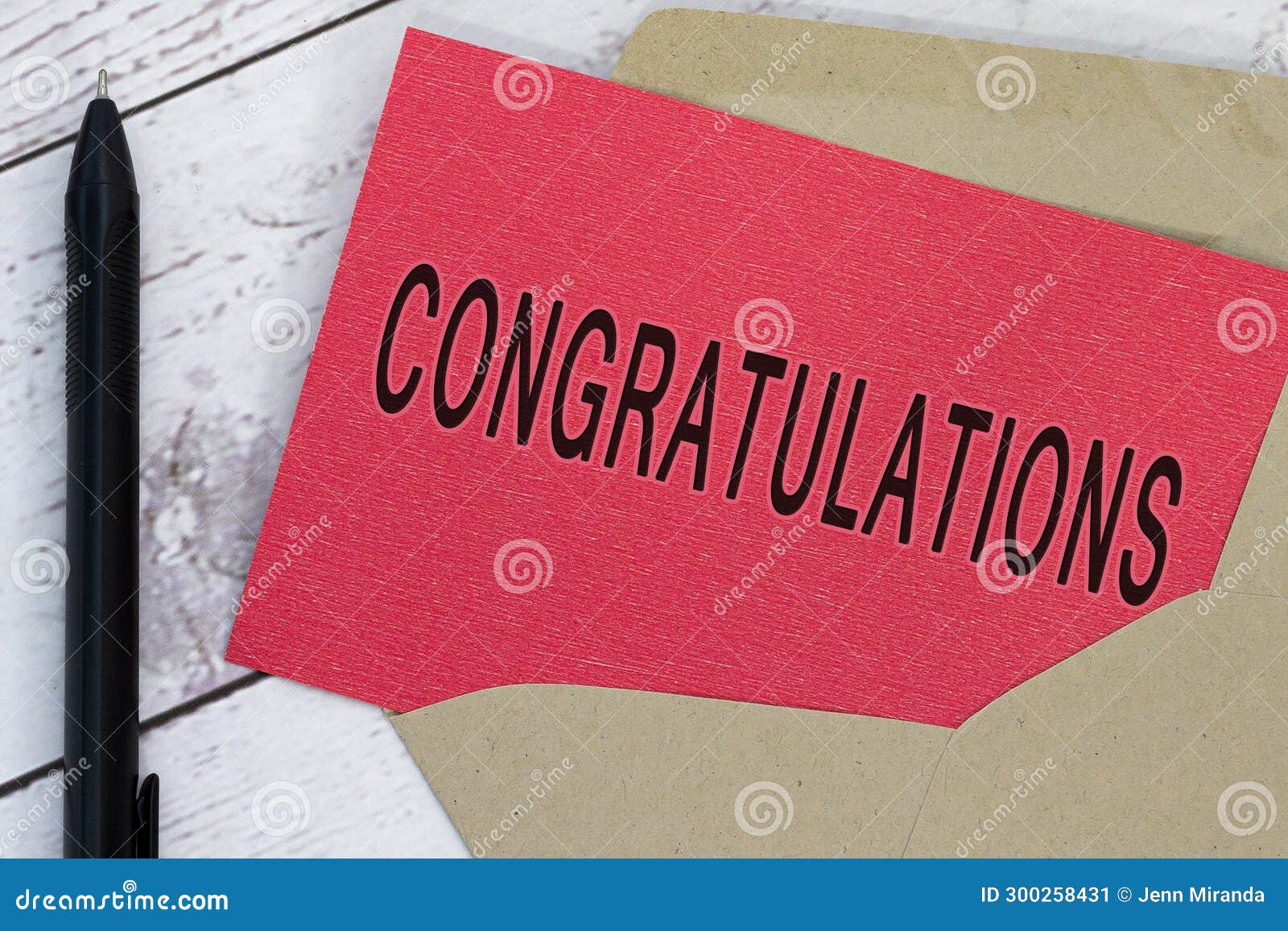 Congratulations Text on Red Card with Envelope and Pen on Wooden Table ...