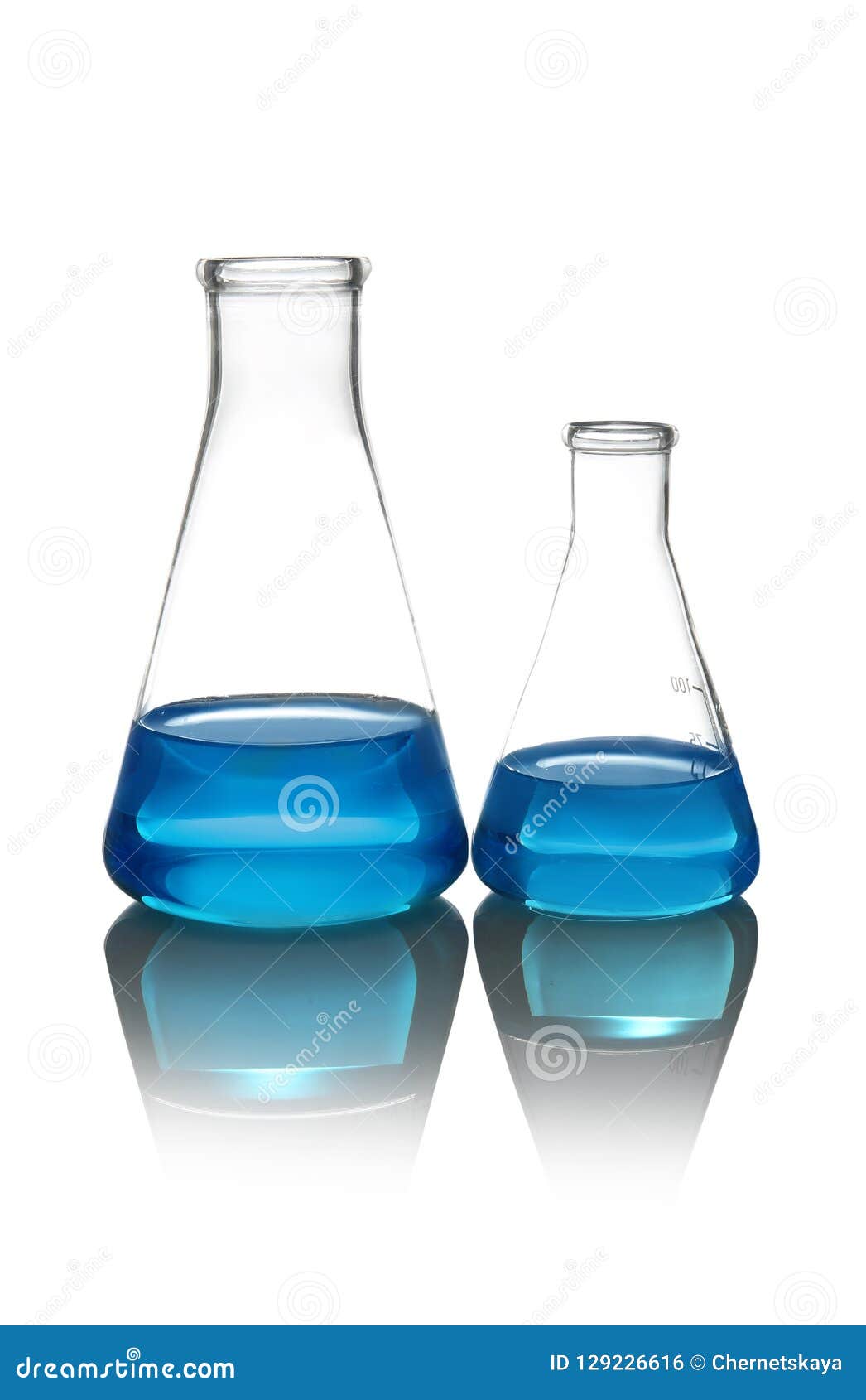 Conical Flasks with Liquid on Table Against White Background Stock ...