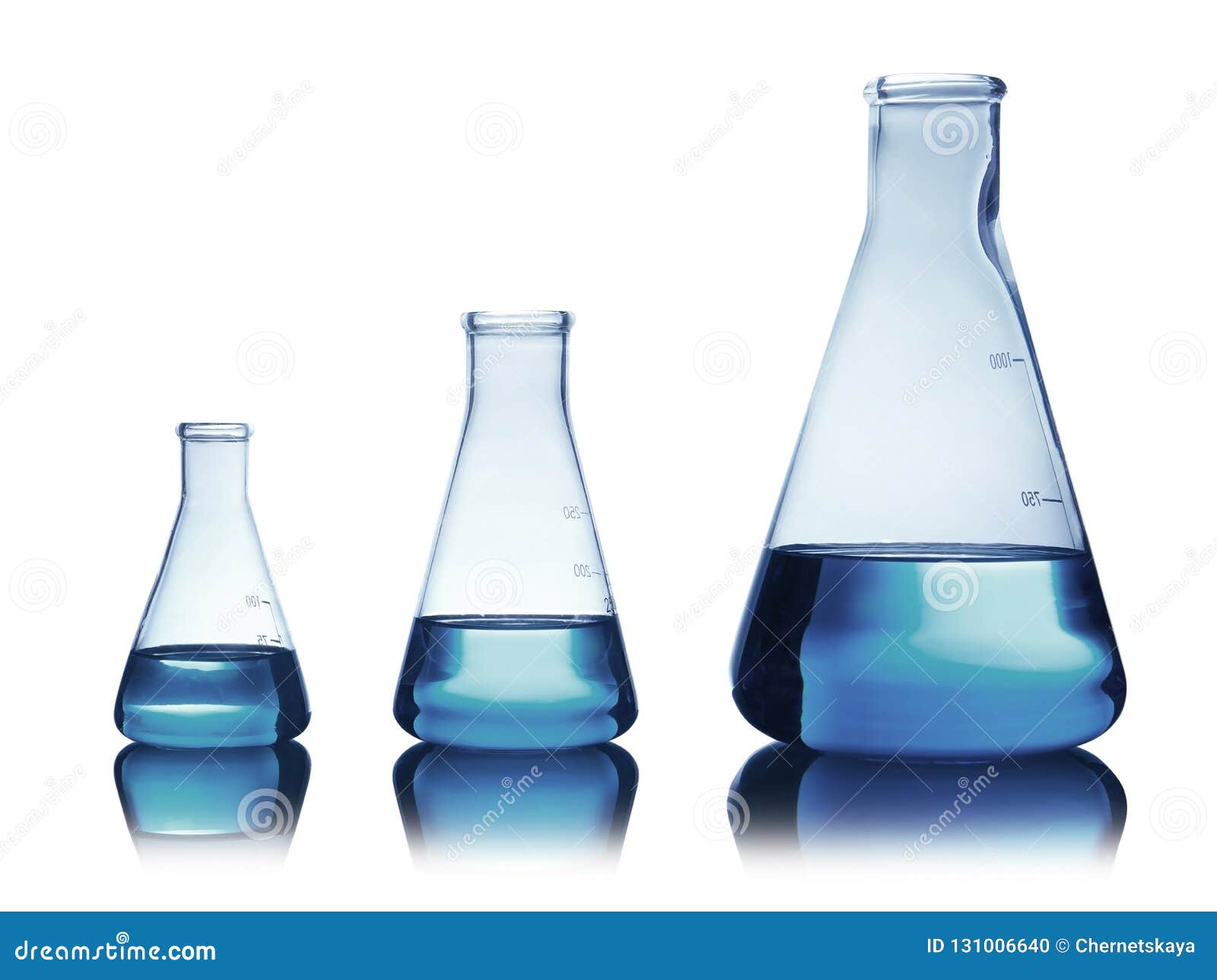 Conical Flasks with Liquid on Table Stock Photo - Image of biology ...