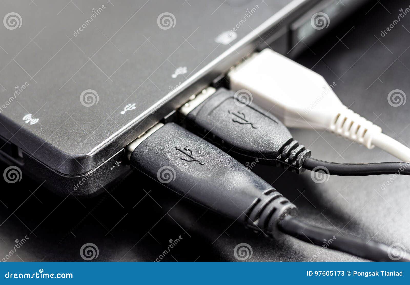 Connect Three USB Cable To Laptop Computer on Black Desk. Stock Image ...