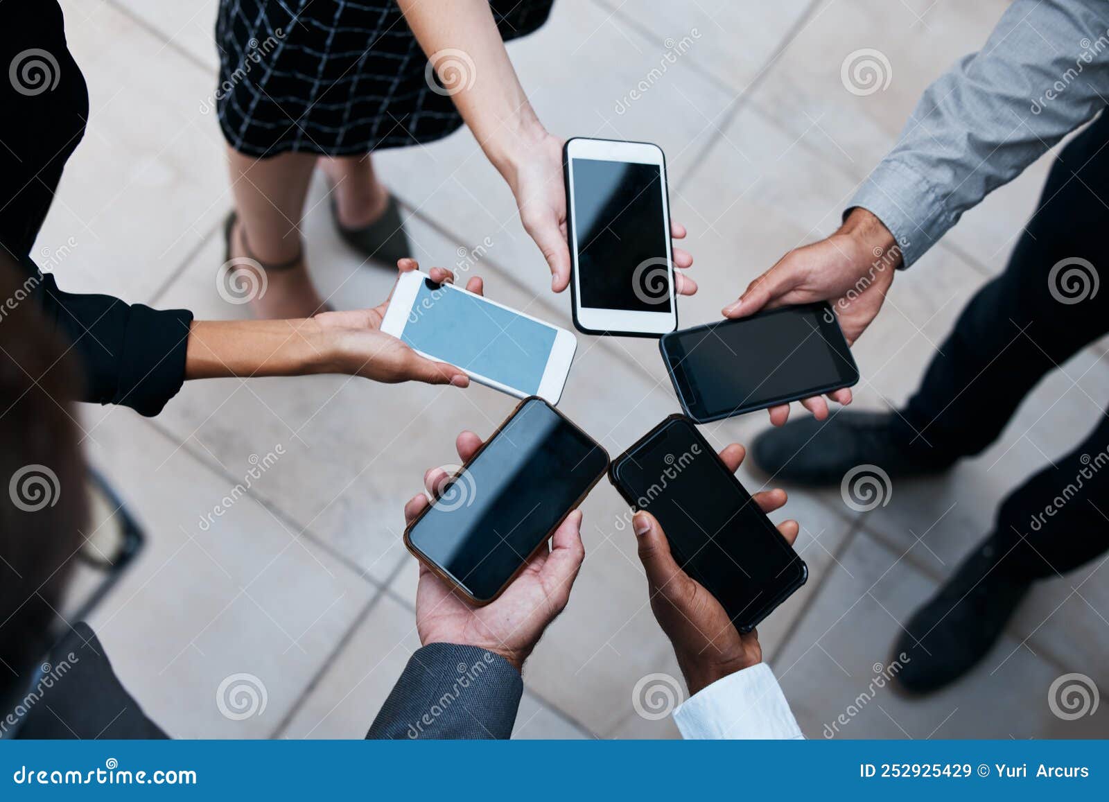 Always Connected As a Team. the Hands of Businesspeople Using Phones ...