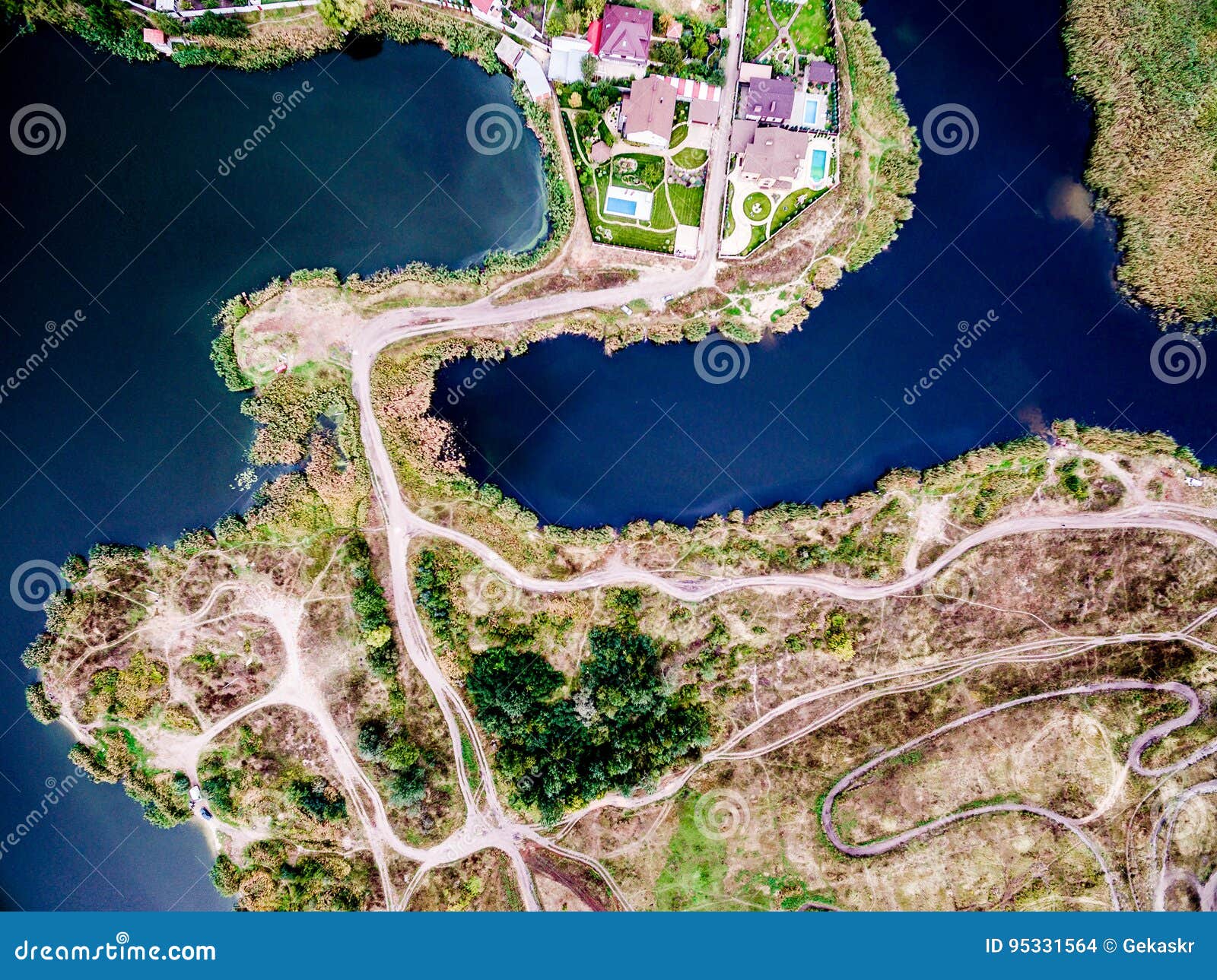 Connected Pieces of Land with Rolled Tracks and Lakes on Sides Stock ...