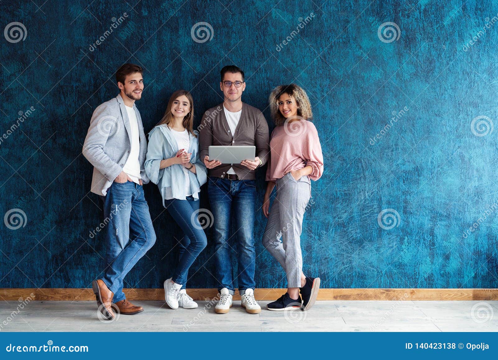 The Connected Team is an Efficient Team. Group of Businesspeople Using ...