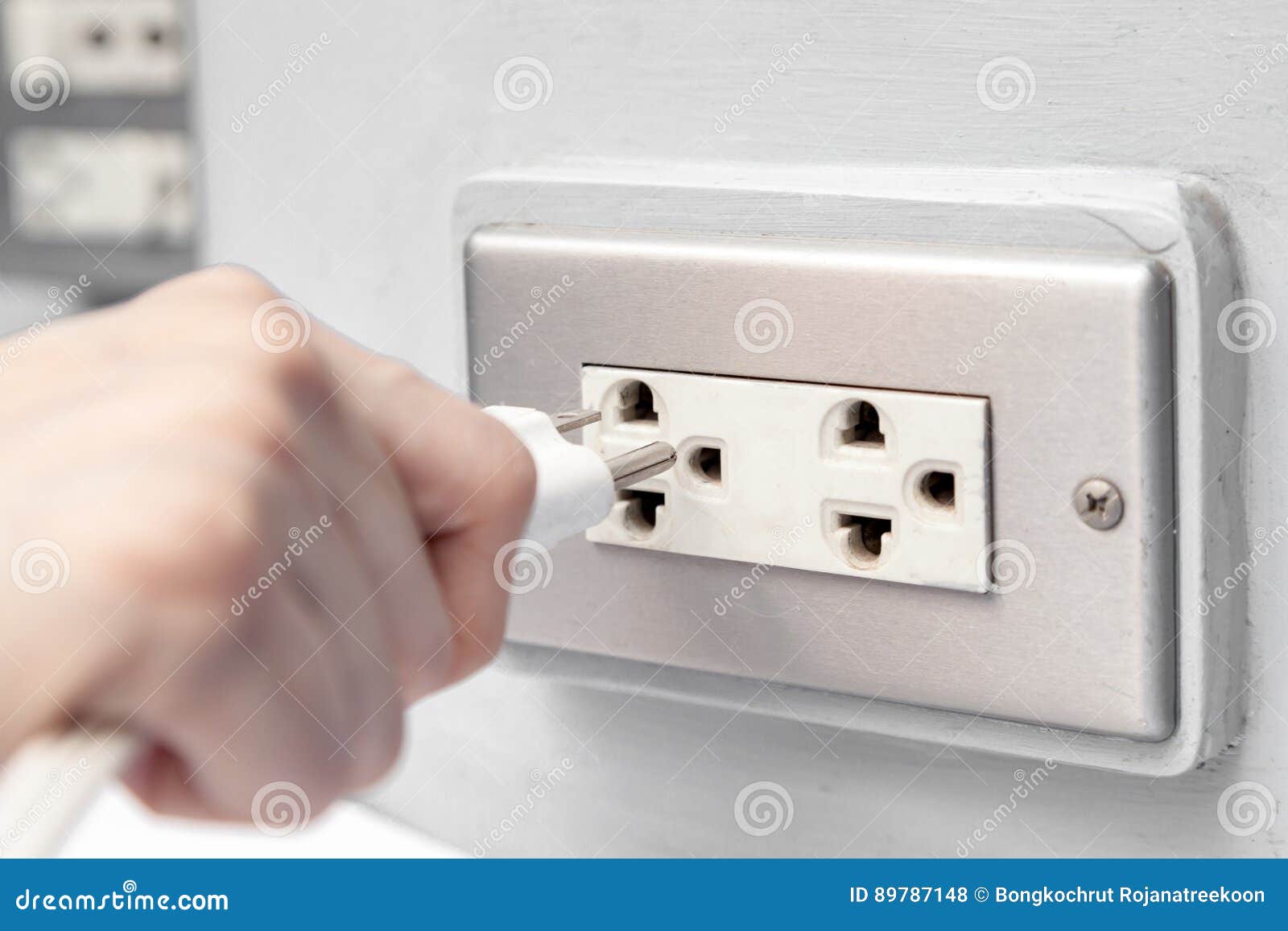 Connecting Electric Plug into Socket Stock Photo - Image of plug ...