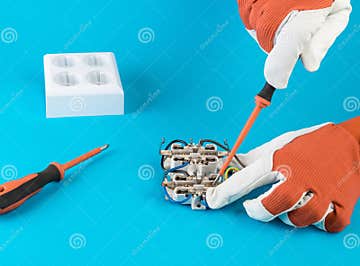 Connecting the Electrical Wire To the Socket Contacts Stock Photo ...