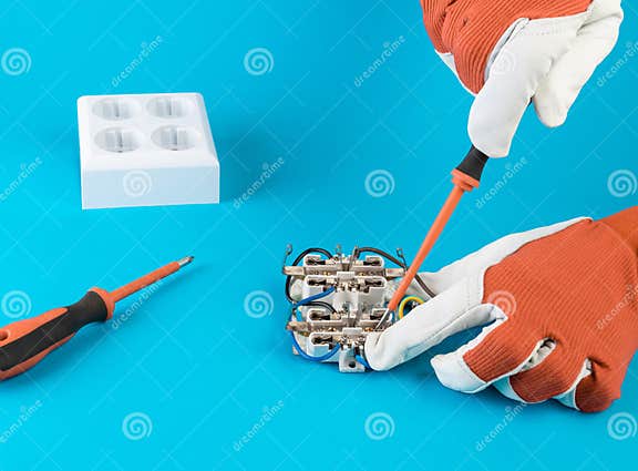 Connecting the Electrical Wire To the Socket Contacts Stock Photo ...