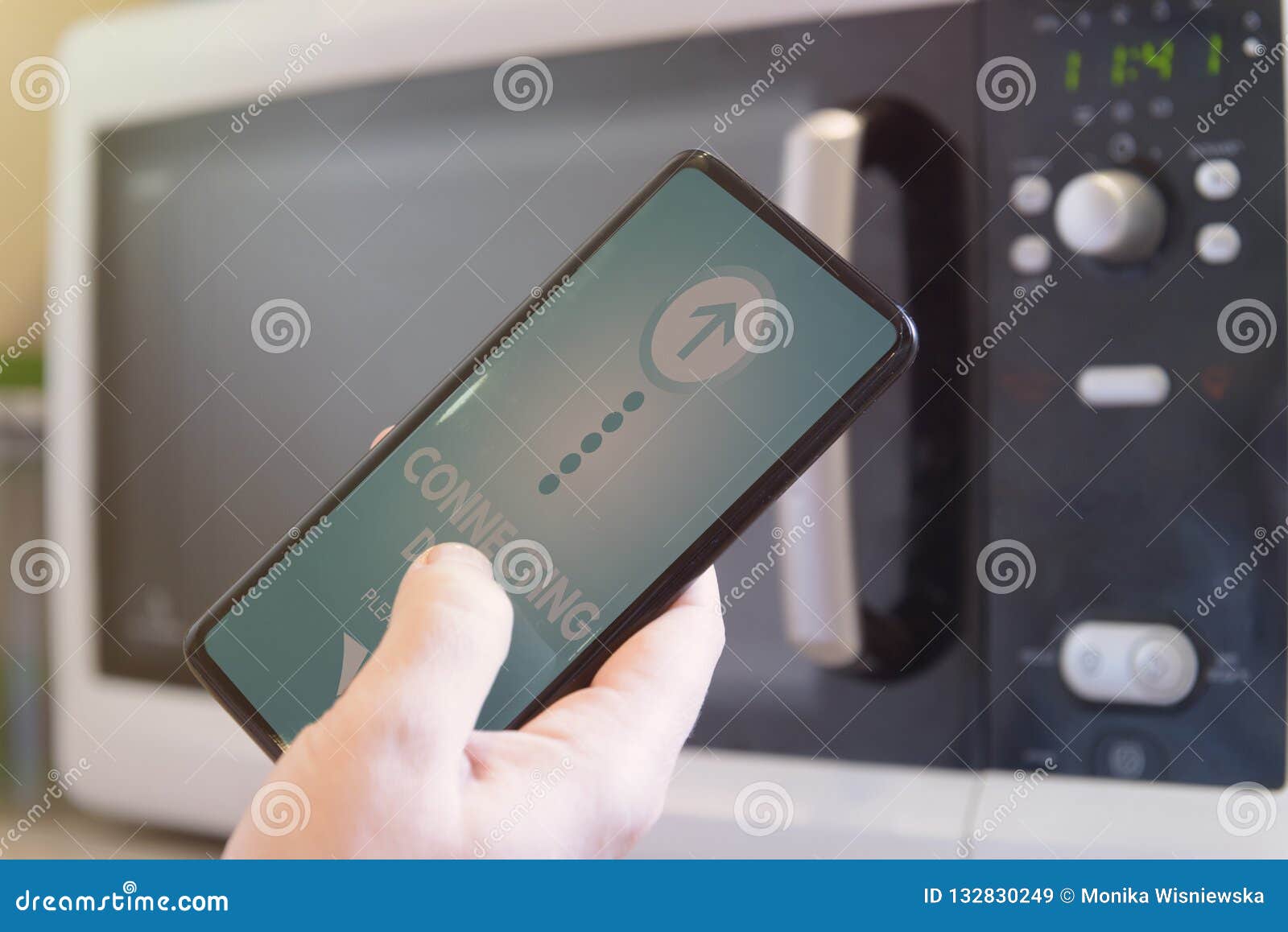 Connecting Microwave Oven with Smart Phone Stock Image - Image of ...