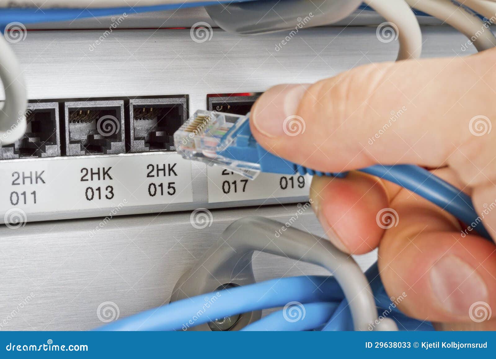 Connecting Network Cable into a Patch Panel Stock Image - Image of ...