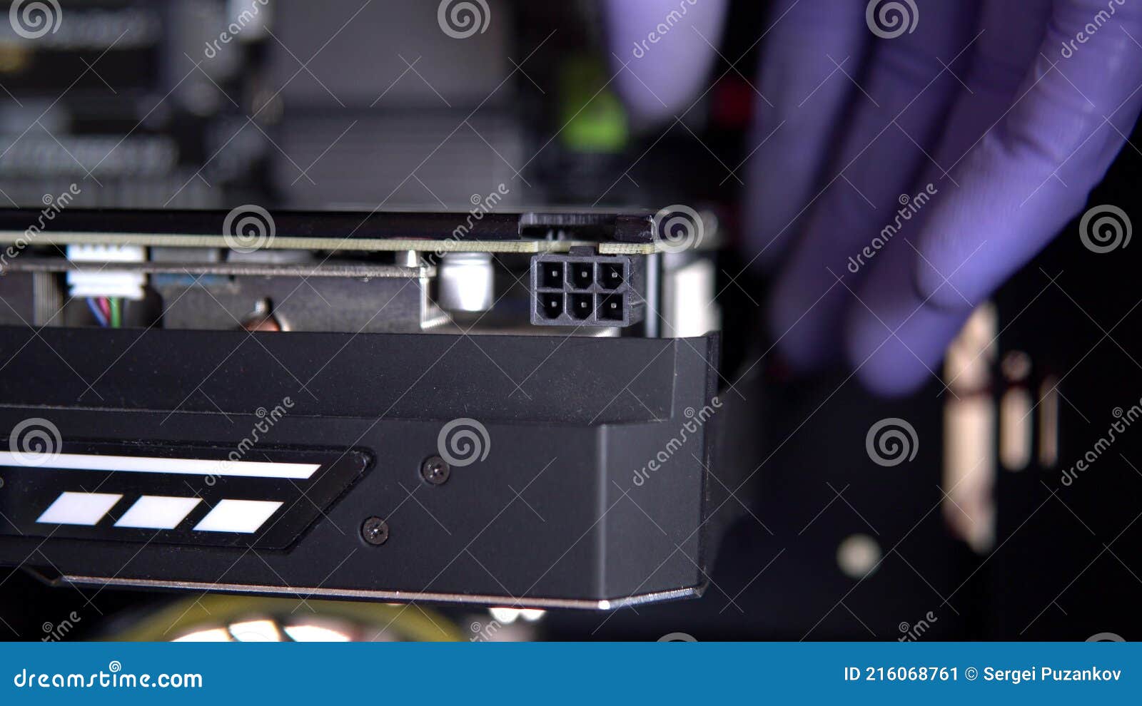 Connecting the Power Plug of the Video Card of a Personal Computer ...