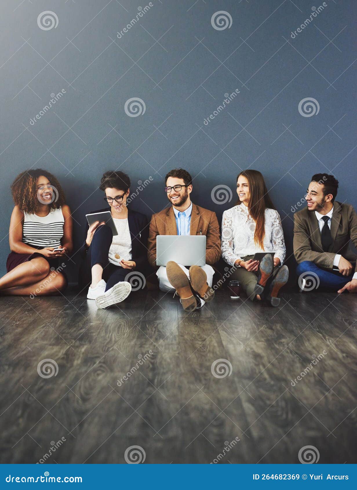 Connecting with the Teammates. Studio Shot of a Group of Businesspeople ...