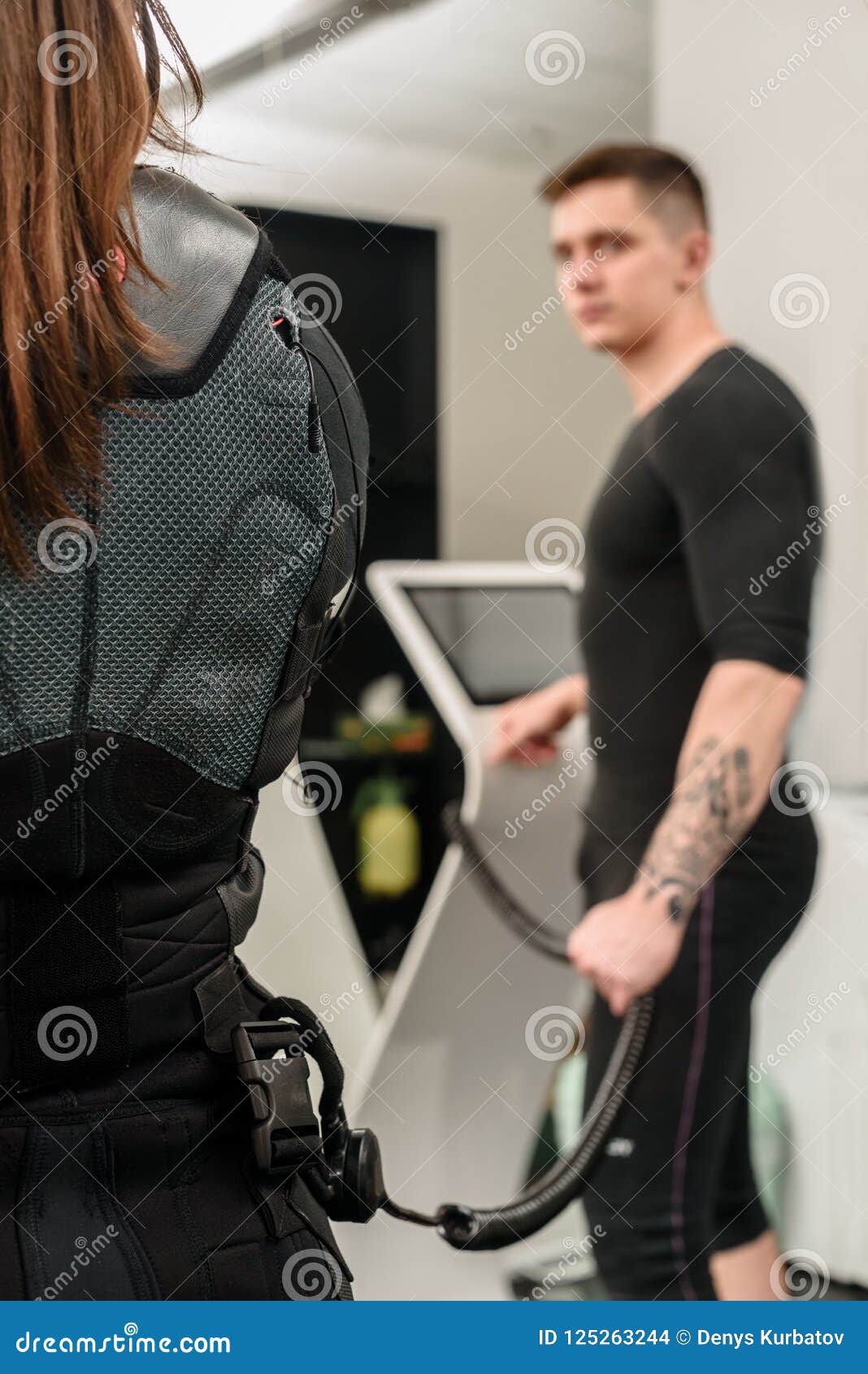 Connecting to EMS machine stock photo. Image of athletic - 125263244
