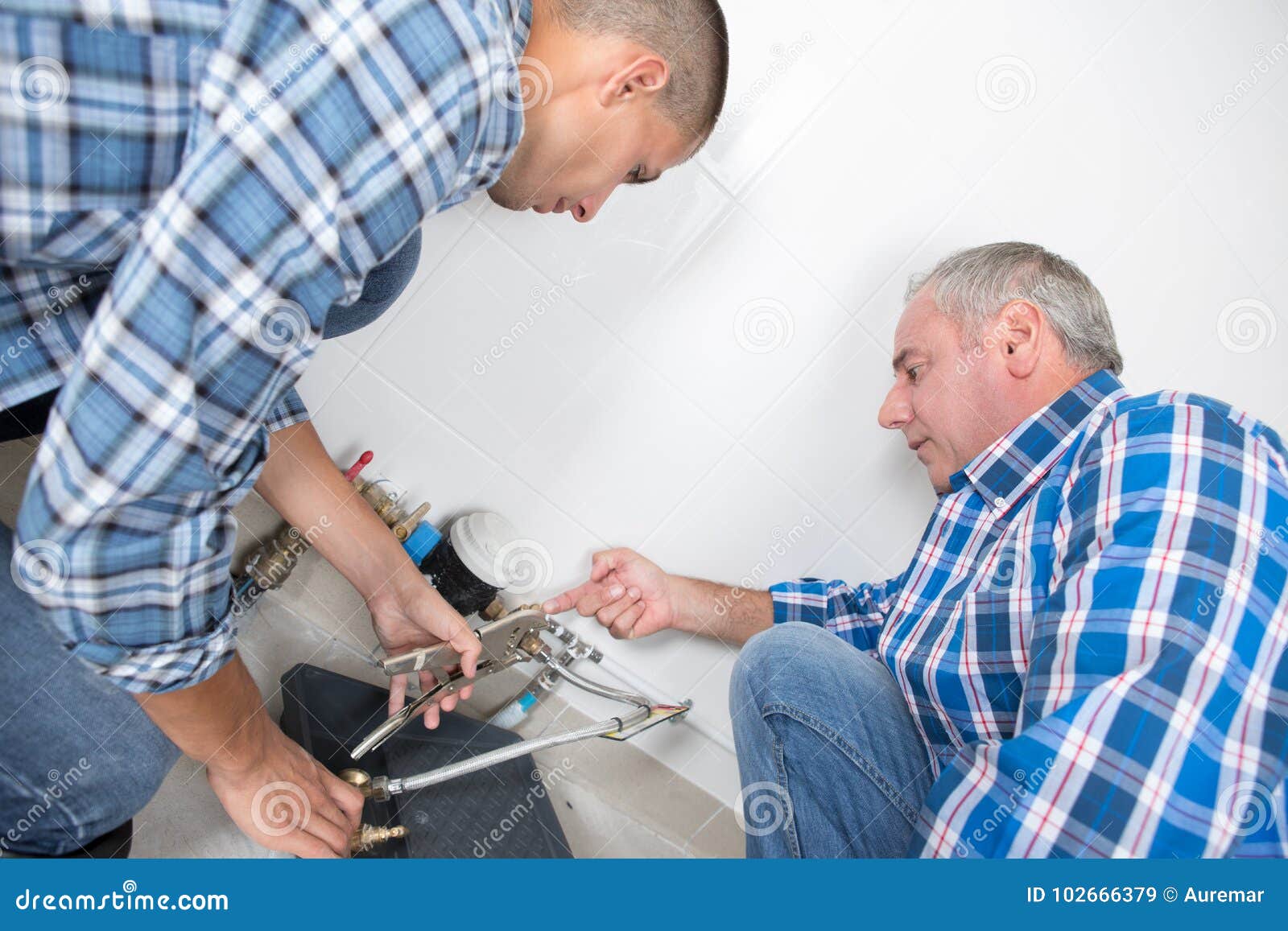 Connecting to main outlet stock image. Image of apprentice - 102666379