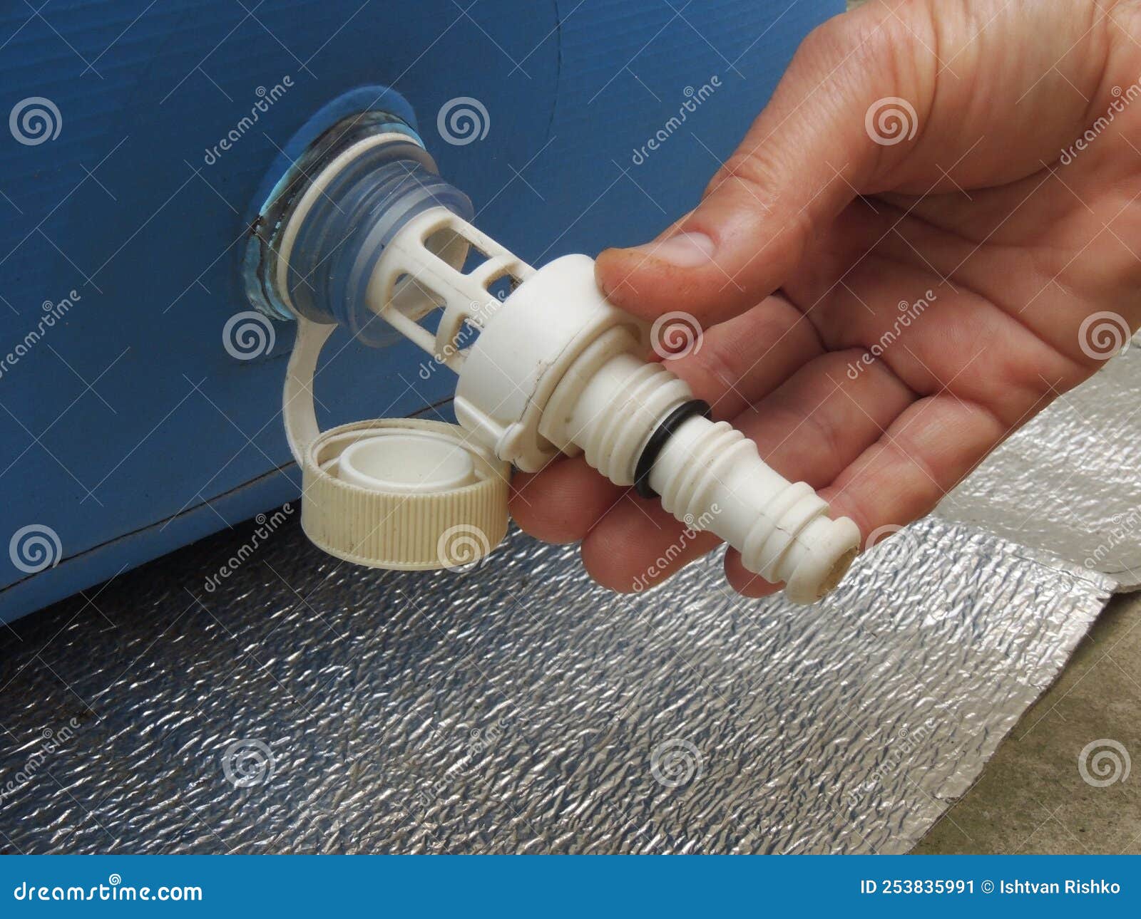 Connecting the Water Drain Pipe To the Valve of a Frame Pool Stock ...