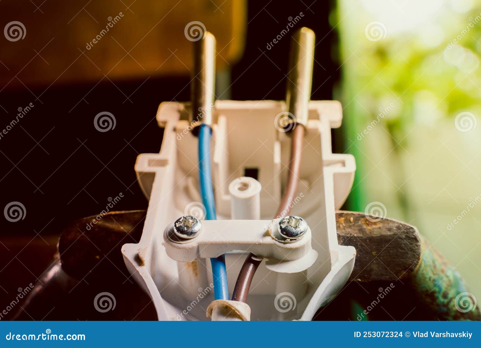 Connecting the Wires of an Electrical Appliance into an Electrical Plug ...