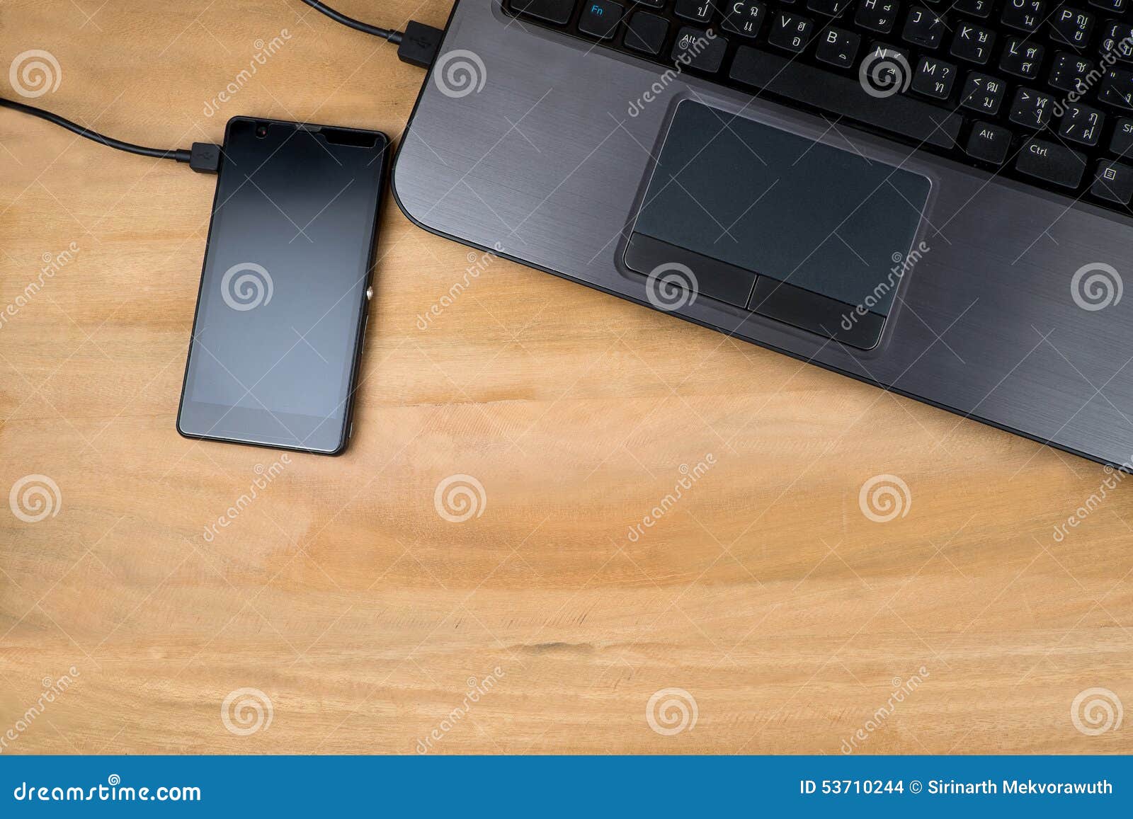 The Connection of Black Mobile Phone and Black Computer Stock Photo ...