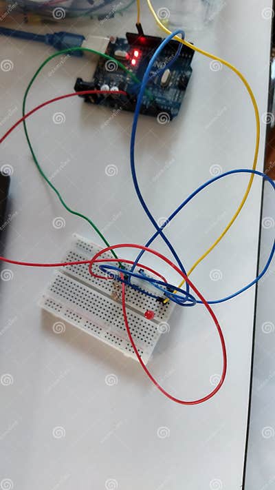 The Connection between Breadboard and Arduino Uno Stock Image - Image ...