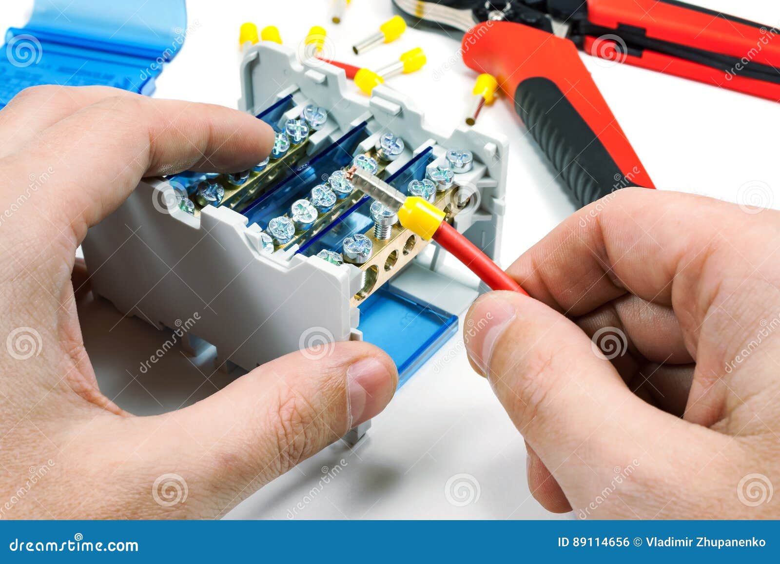 Connection Electric Cross-terminal To the Power Cable on a White ...