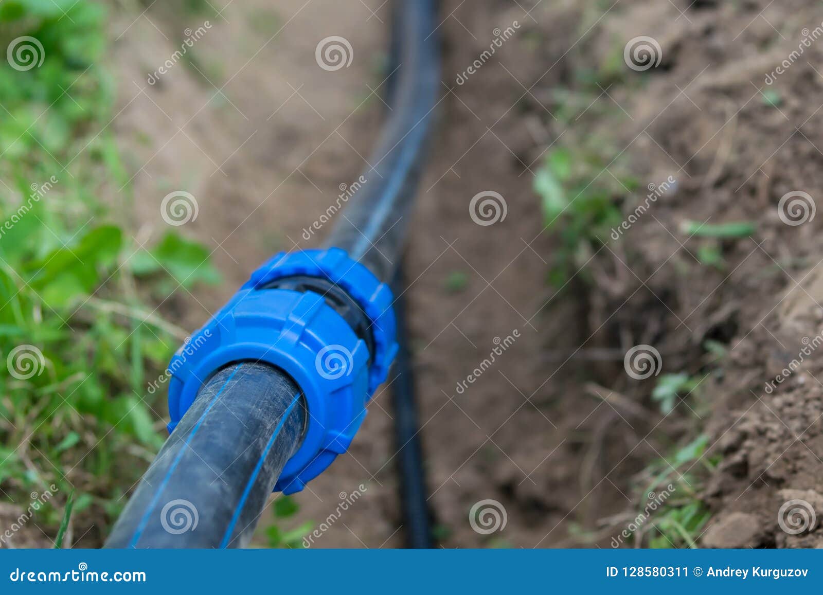 Connection of Water Pipe Close Up Against the Background of the Earth ...