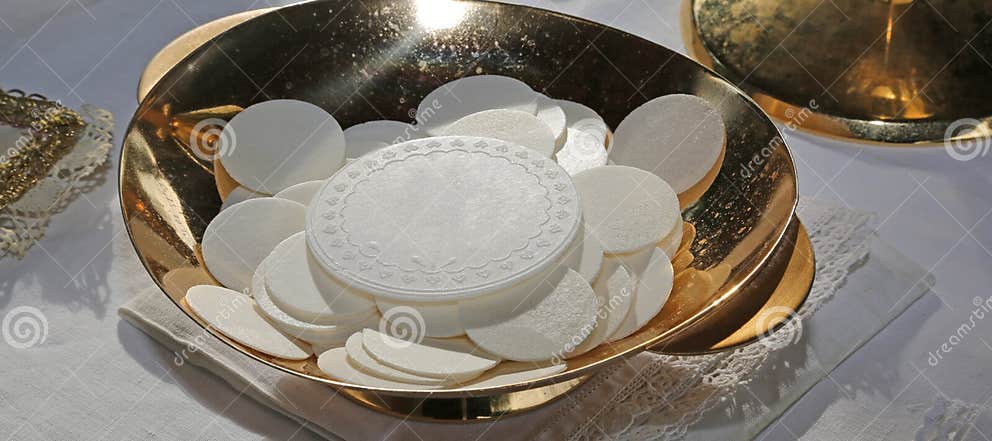 Consecrated Host during the Mass of First Communion Stock Photo - Image ...