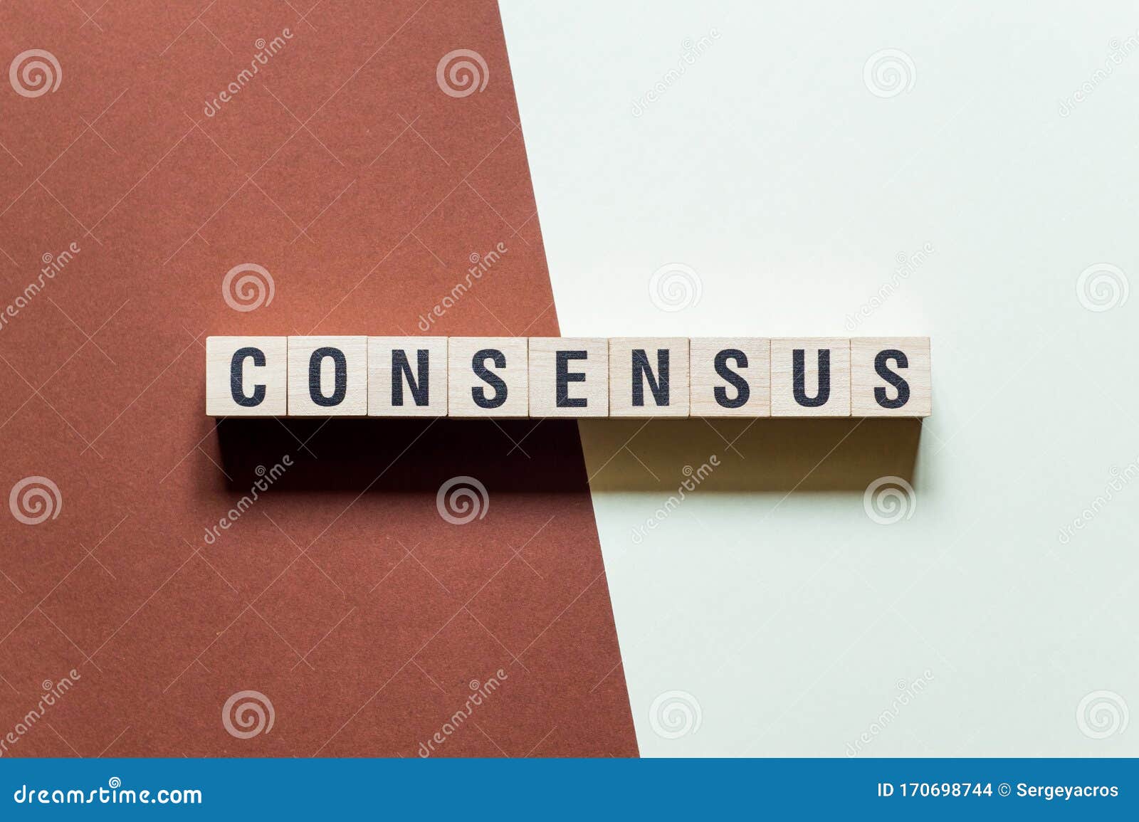 CONSENSUS Word Made With Building Blocks On The Bright Yellow ...