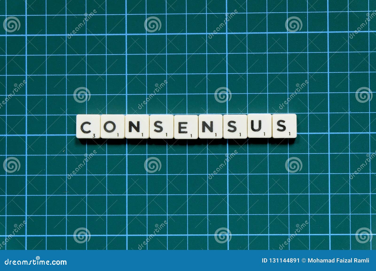 Consensus Word Made of Square Letter Block on Green Square Mat ...