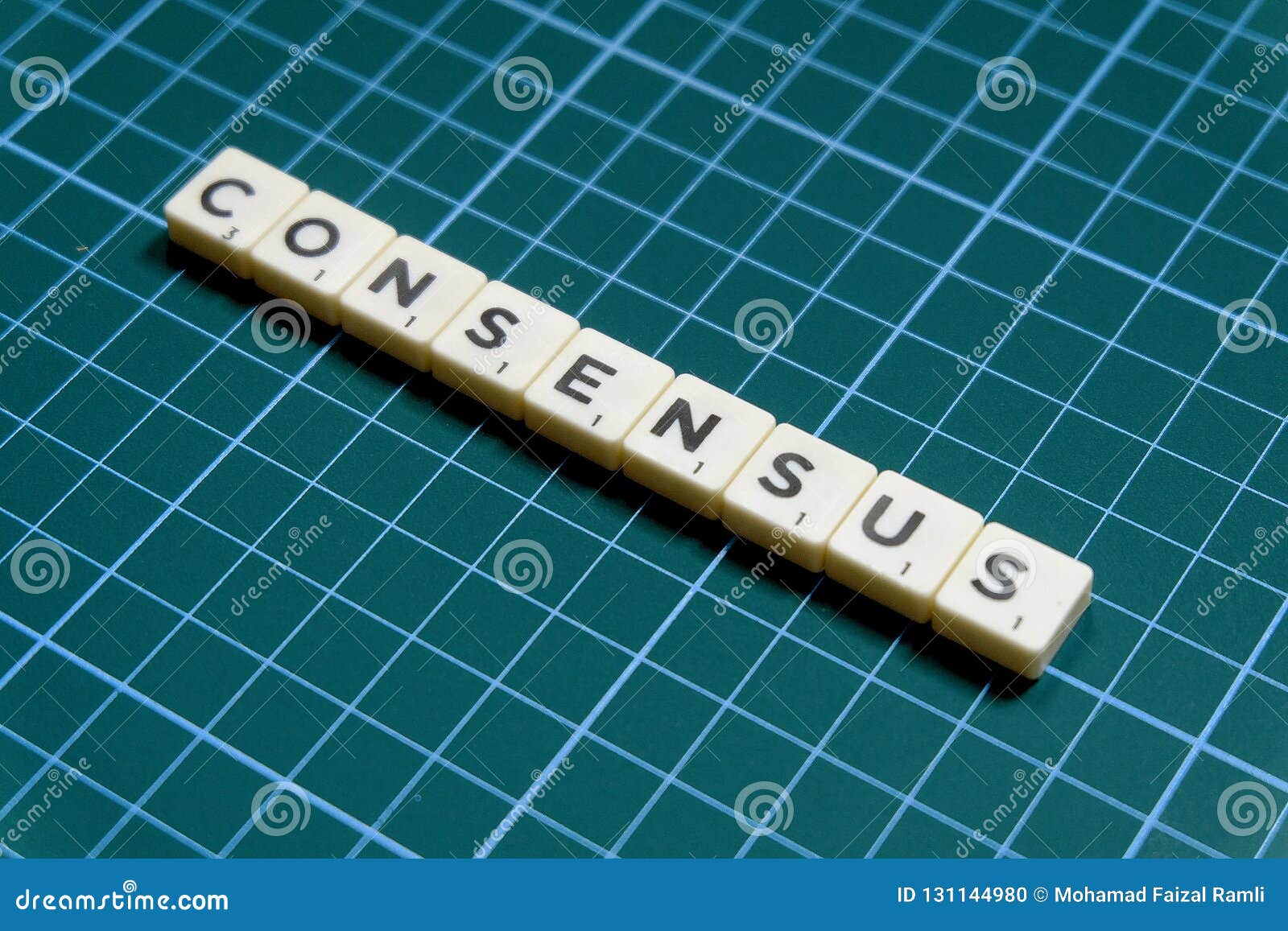 Consensus Word Made Of Square Letter Block On Green Square Mat ...