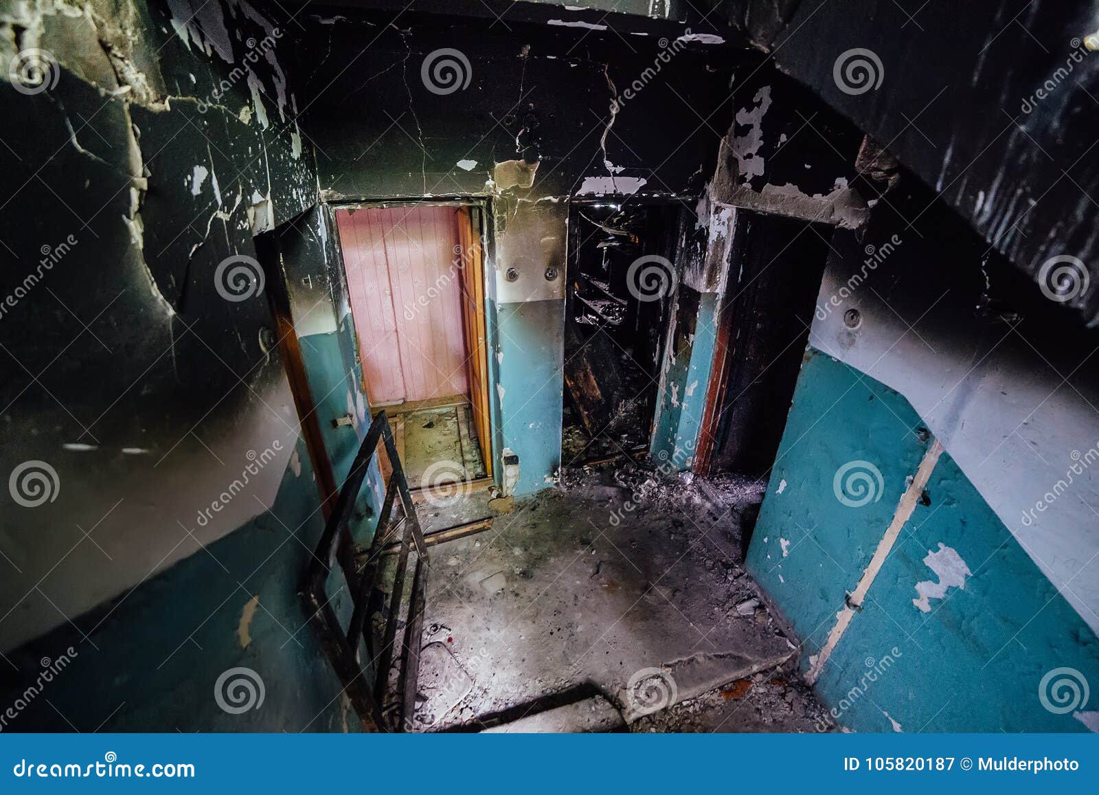 Consequences of Fire in Apartment Building. Burnt Staircase and Doors ...