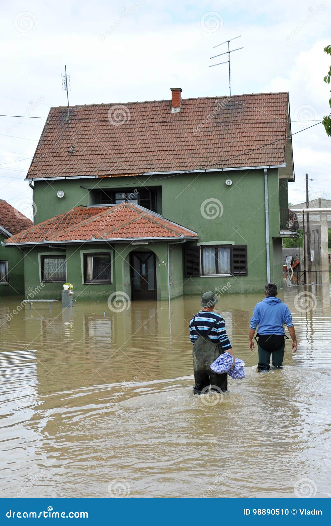 The Consequences of Flooding, Flooded House with People. Editorial ...