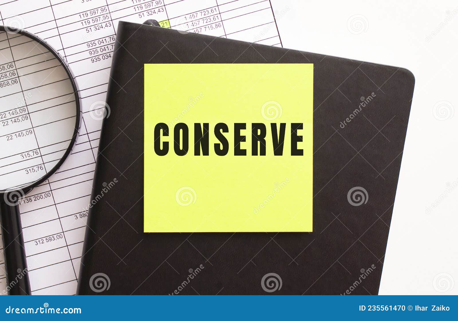 CONSERVE Text on a Sticker on Your Desktop. Diary and Magnifier Stock ...