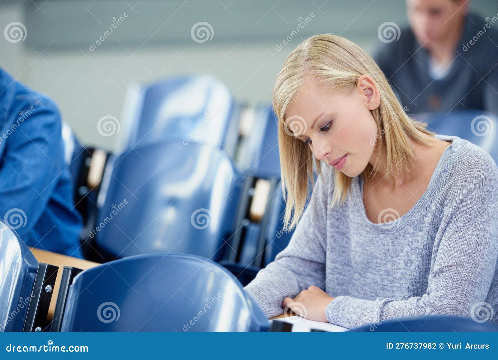 Considering Her Answer Carefully. an Attractive College Student ...