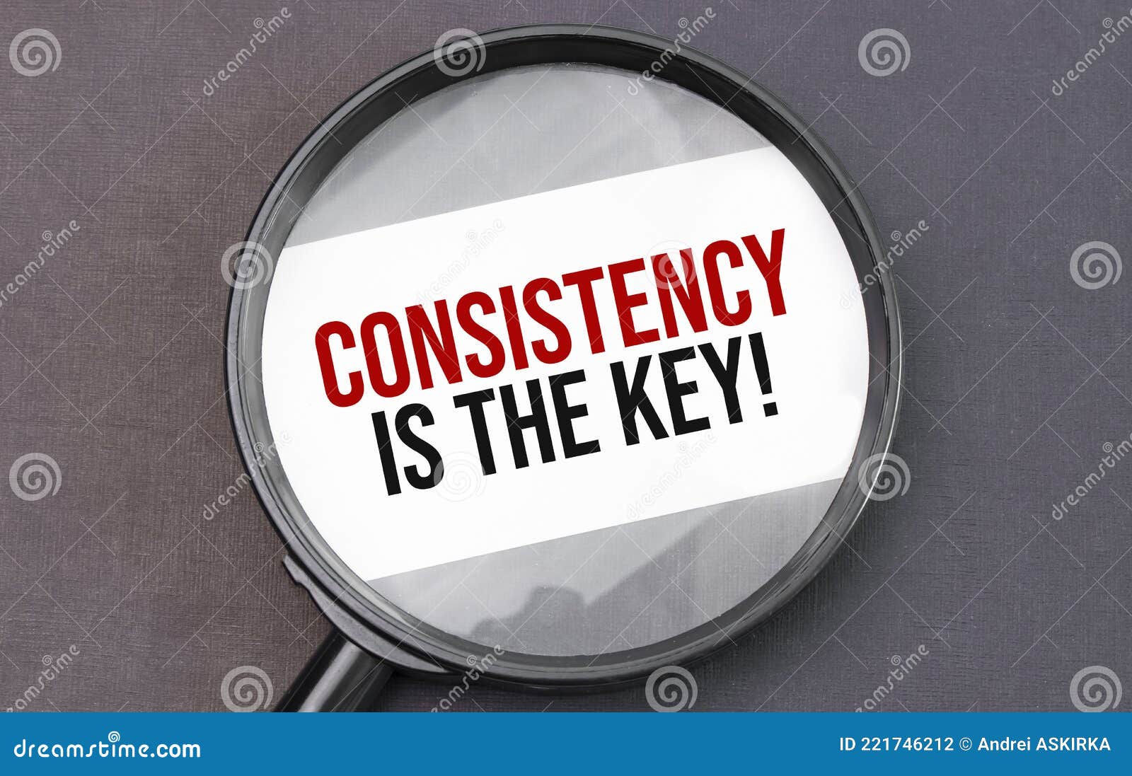 Consistency is the Key Word on Paper through Magnifying Lens Stock ...