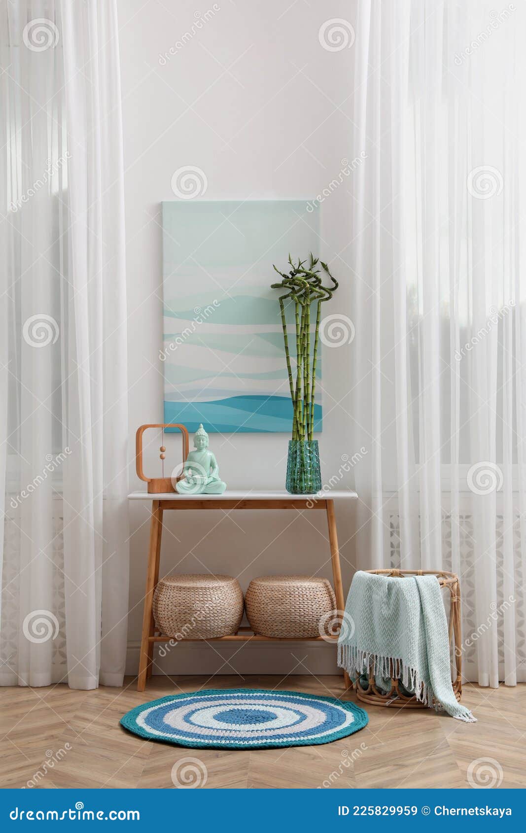 Console Table with Bamboo and Buddha Statue Near Wall Indoors. Interior ...
