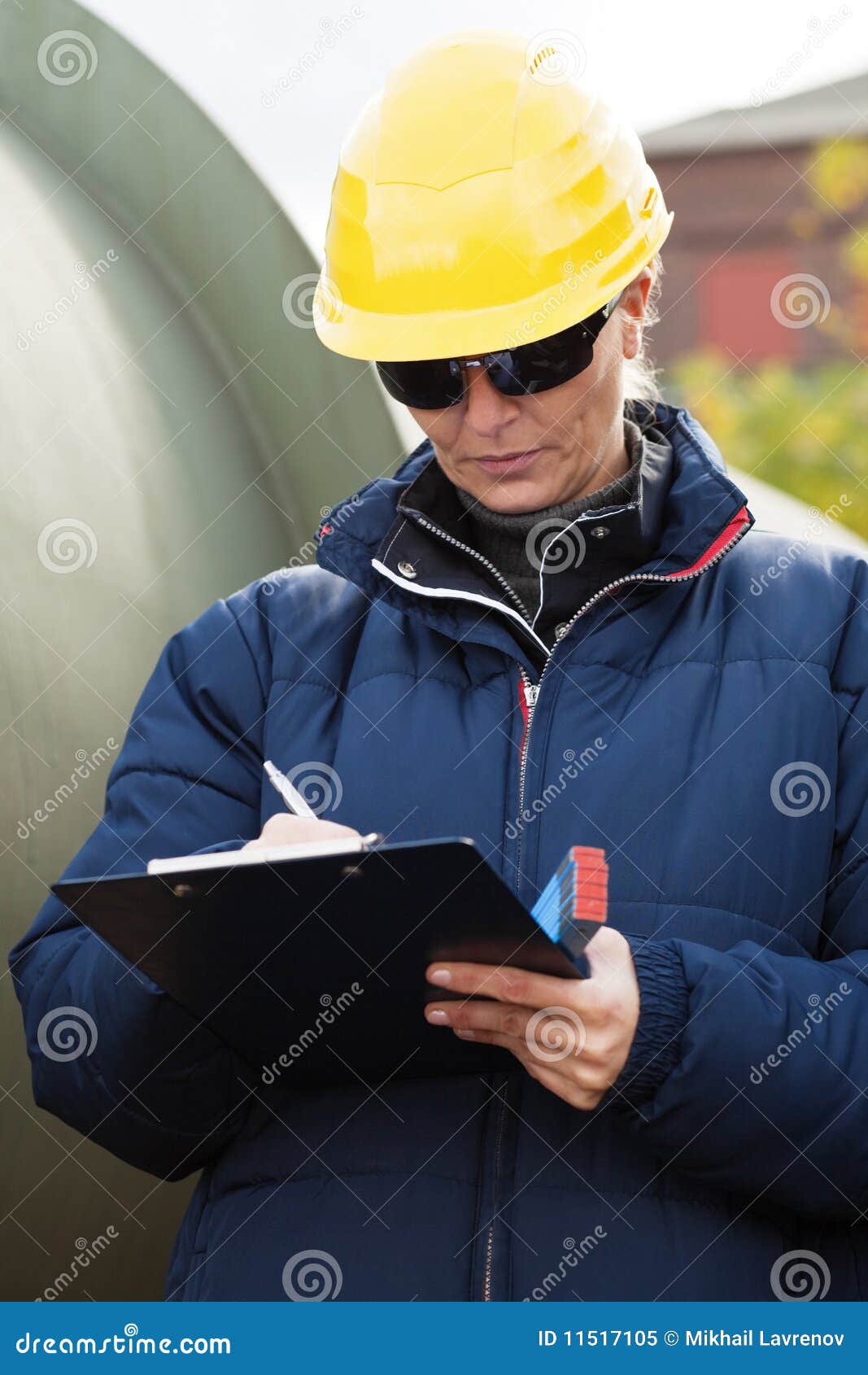 Construciton Engineer Taking Notes Stock Image - Image of hard ...