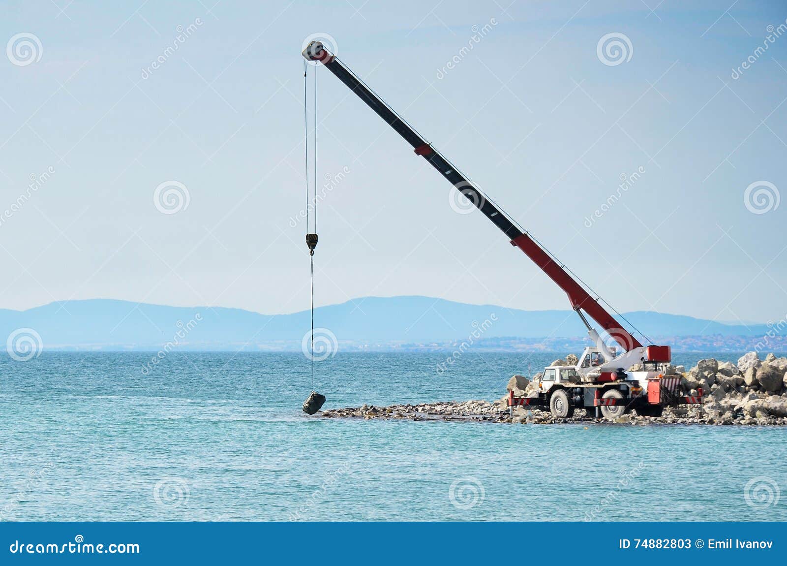 Constructing a Wave Breaker Stock Image - Image of machine, crane: 74882803
