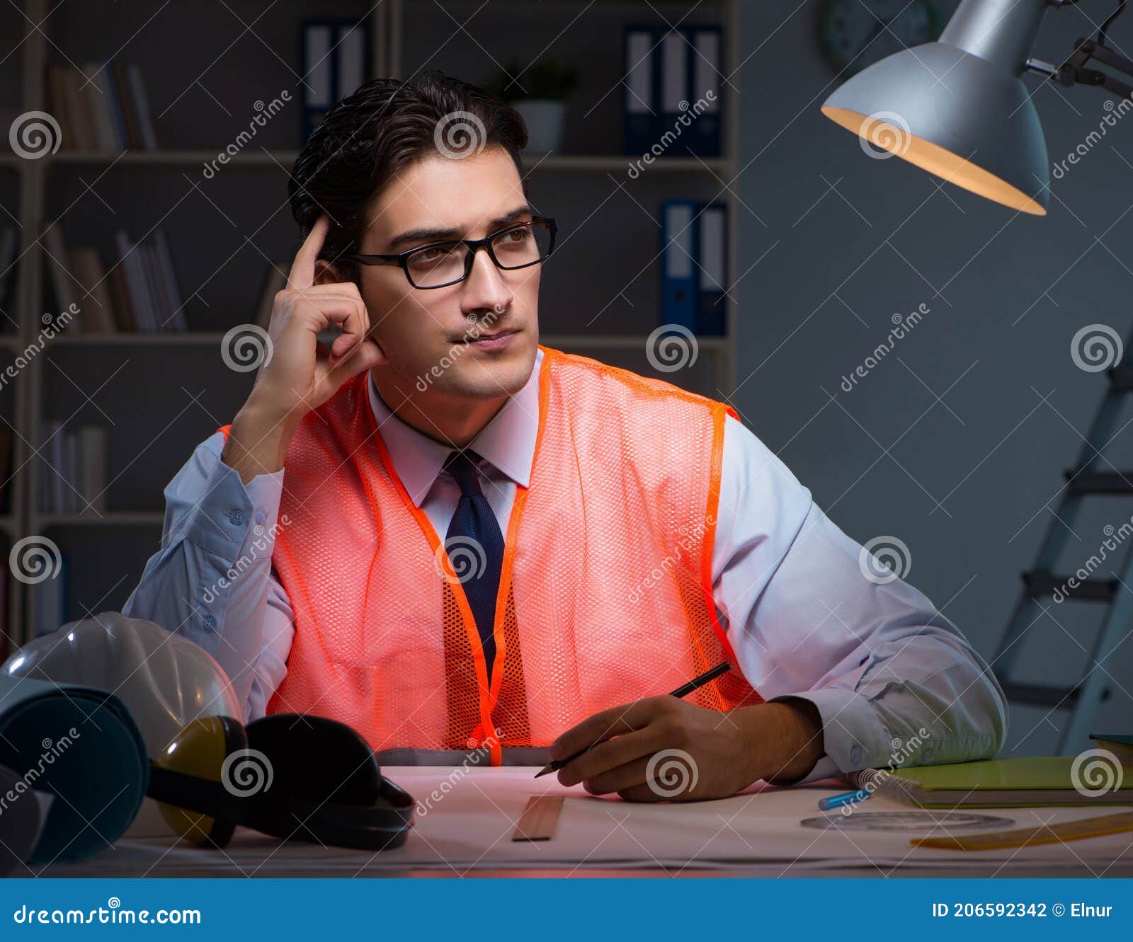 Construction Architect Working on Drawings Late at Night Stock Photo ...