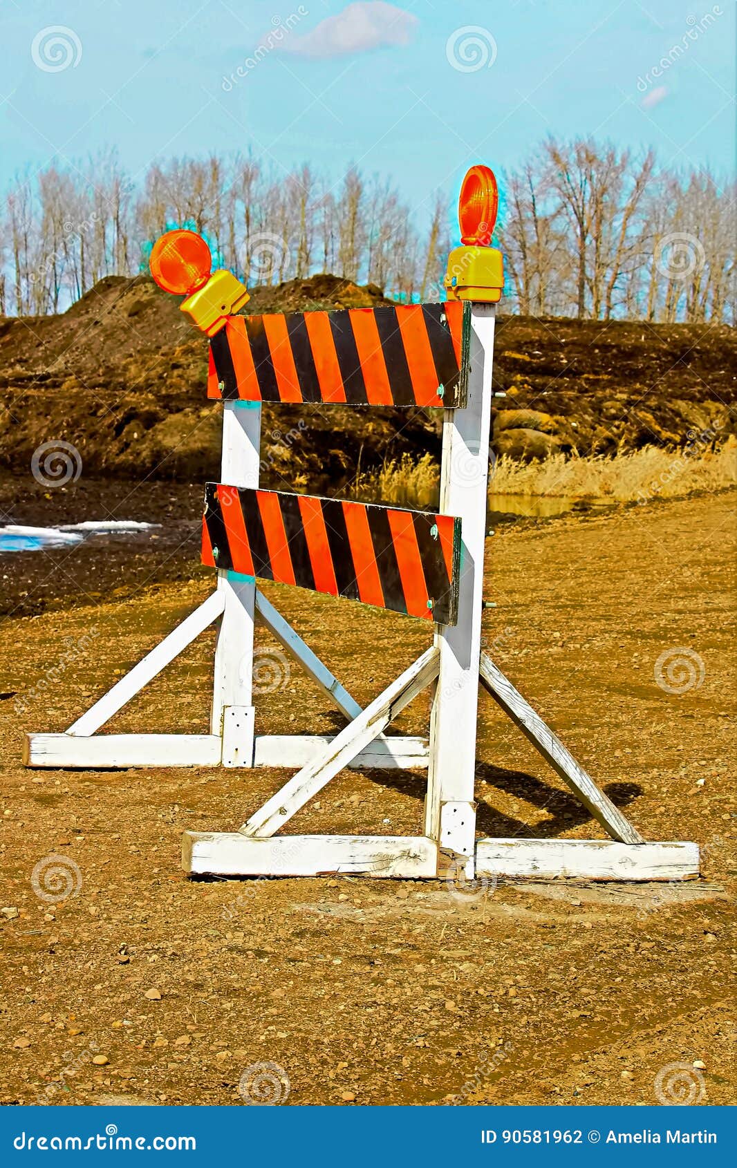 A Construction Barricade on a Gravel Road Stock Photo - Image of ...