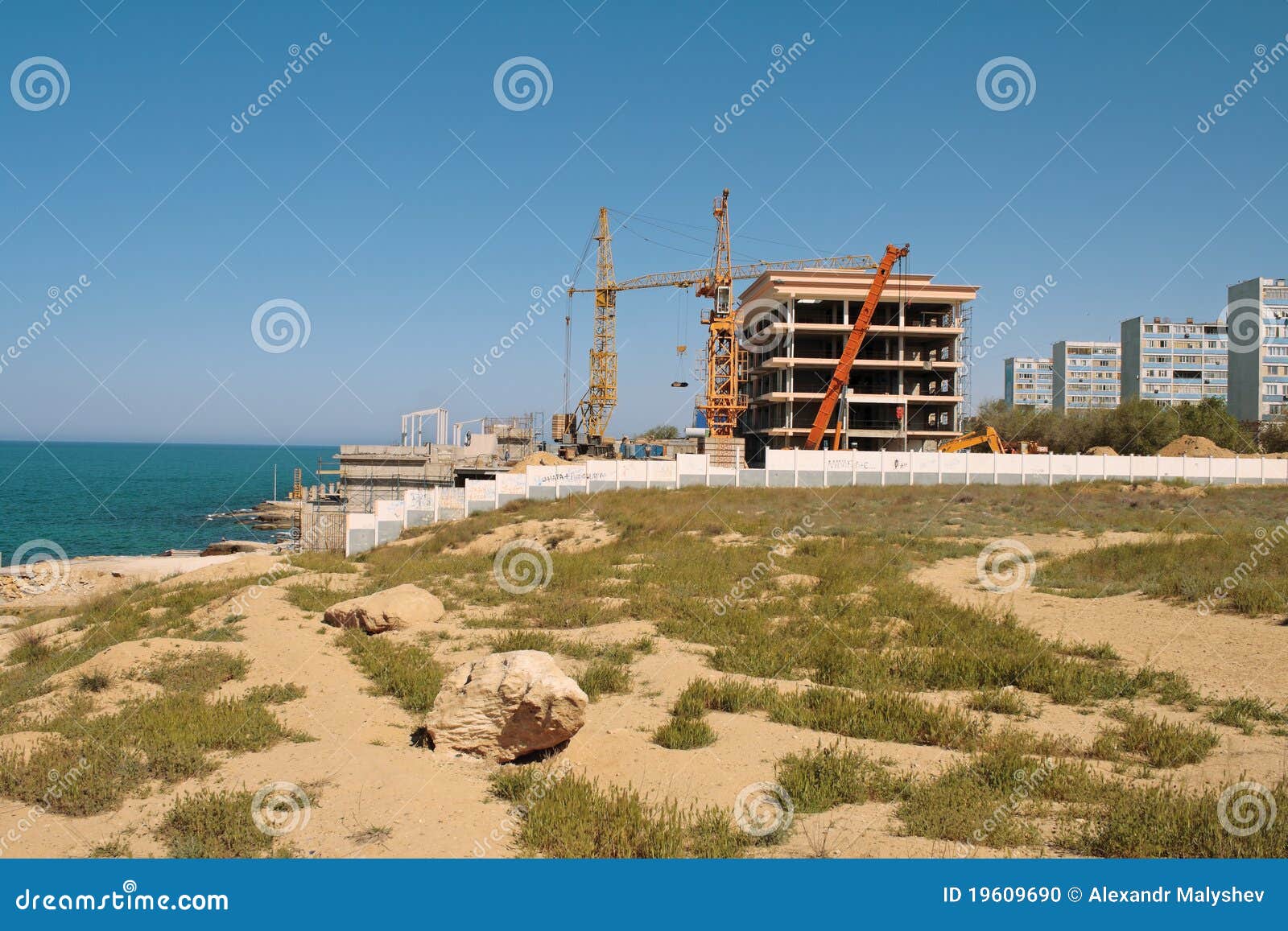 Construction on the beach. stock photo. Image of water - 19609690
