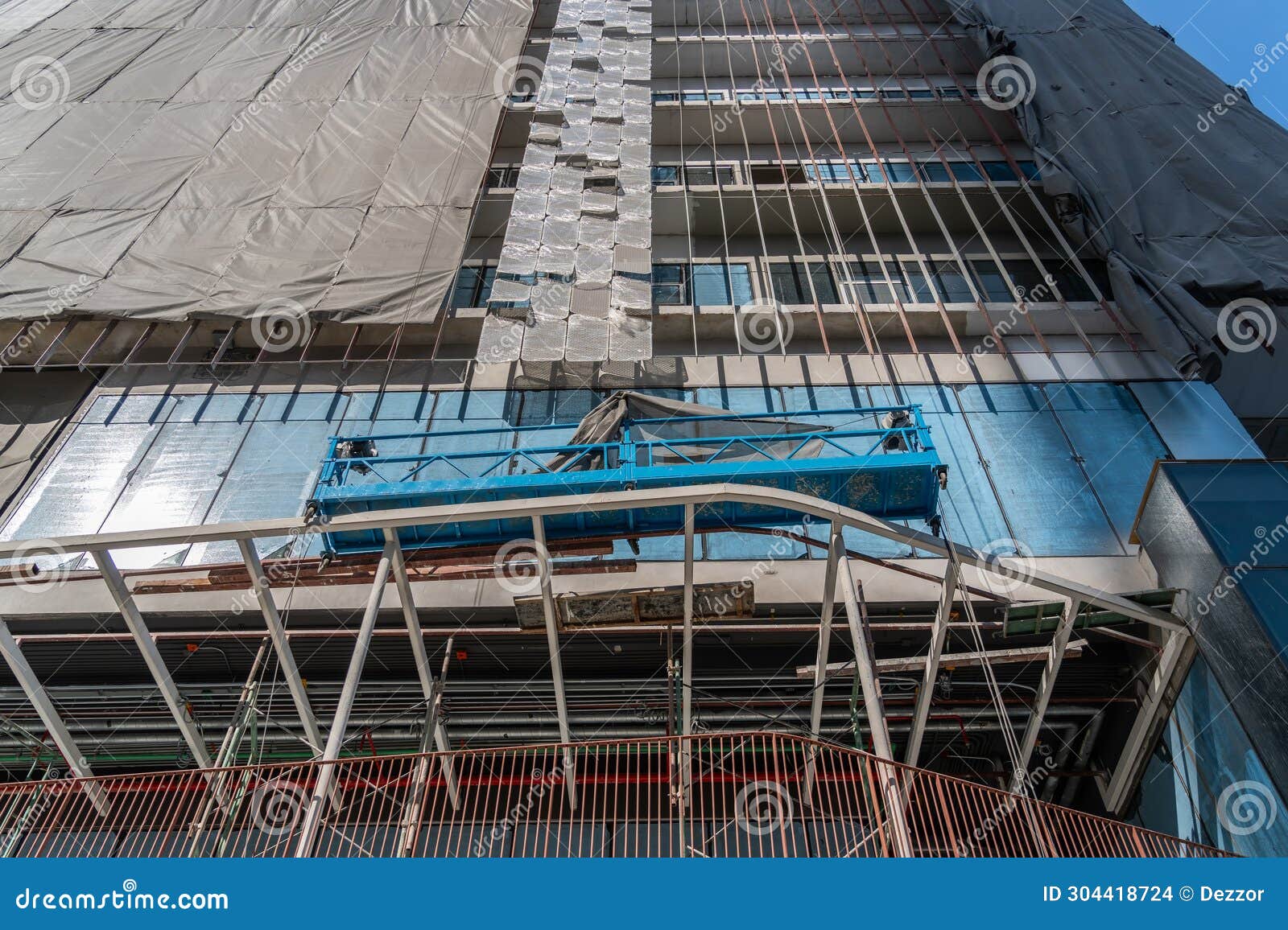 Construction Blue Concrete Cradle on the Lower Floors of a Skyscraper ...