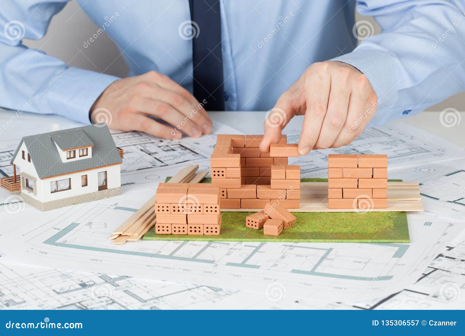 Construction with Brick on Blueprint Stock Image - Image of architect ...