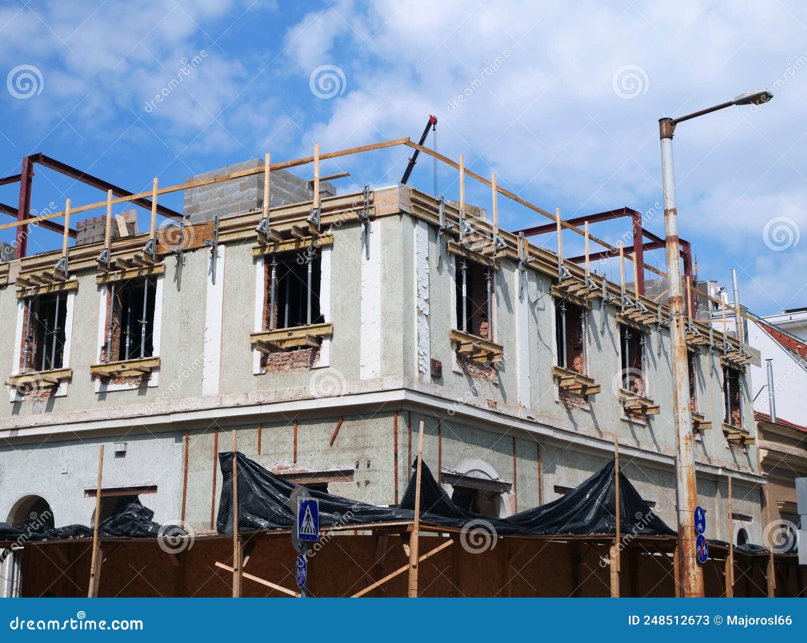 Construction of a Brick Building Stock Image - Image of blue, building ...