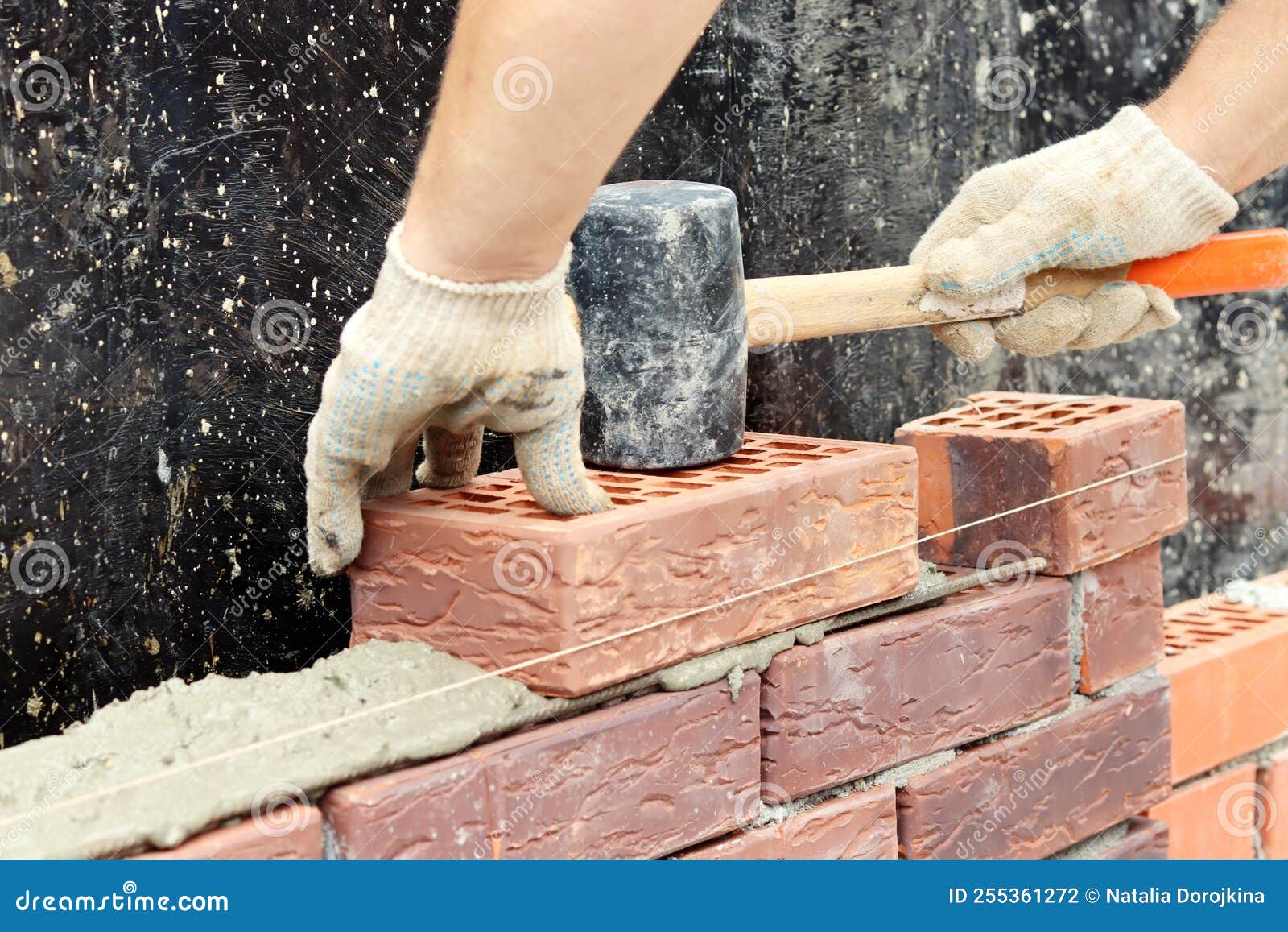 Construction of a Brick Wall. Brick Laying. Selective Focus Stock Photo ...