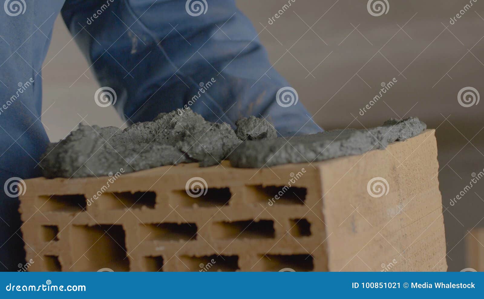 Construction of Brick Wall. Trowel Spreading Cement on Bricks Stock ...