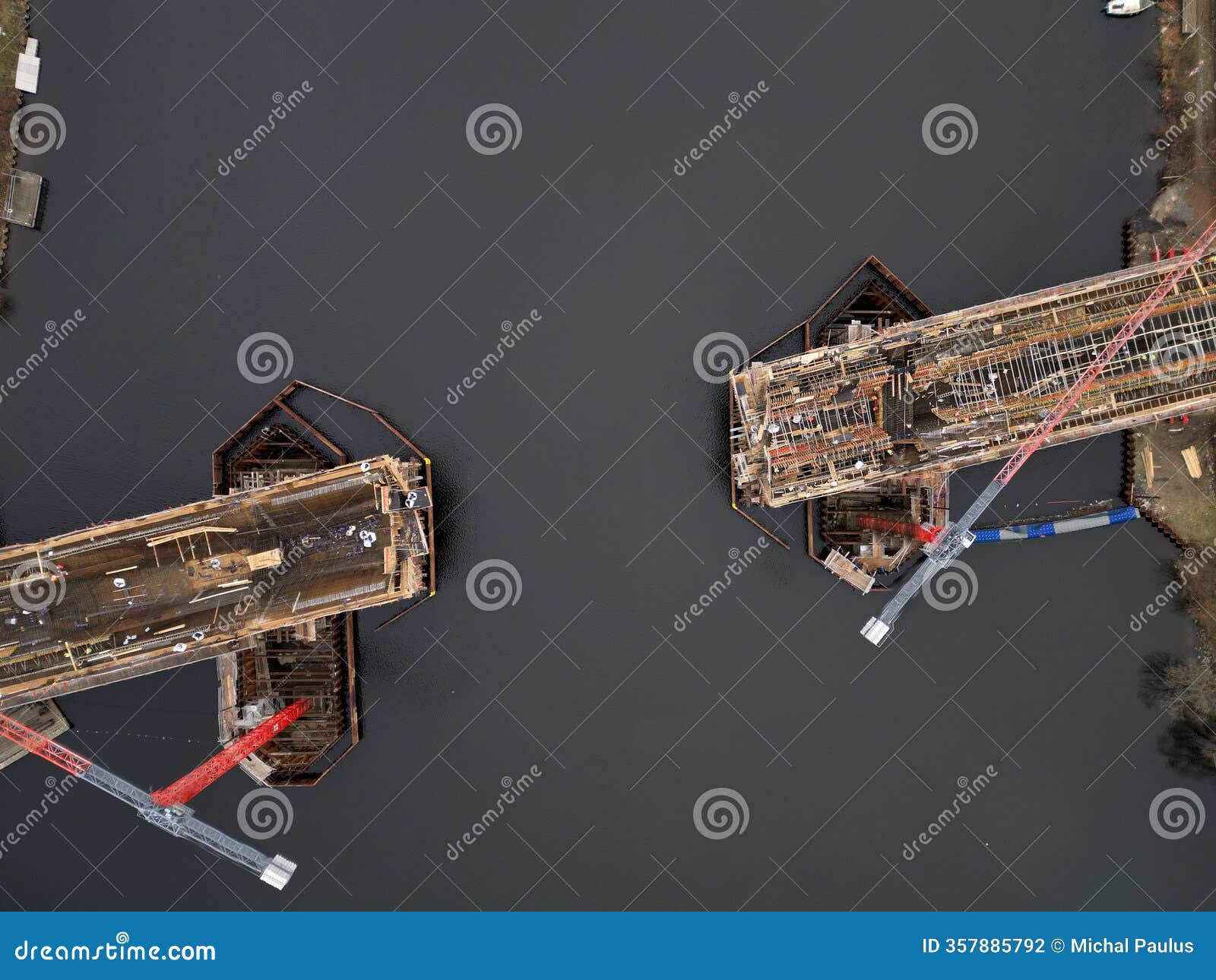 Construction of Bridge Ove River. Casting Concrete into Wire Struts ...