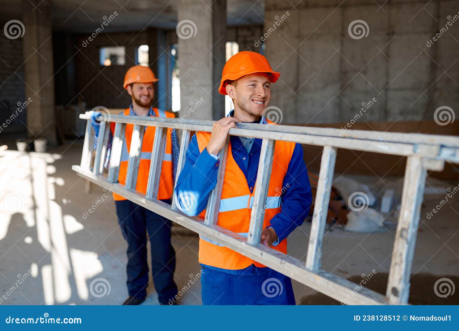 Construction Builder Workers Carrying Steel Ladder Together Stock Photo ...