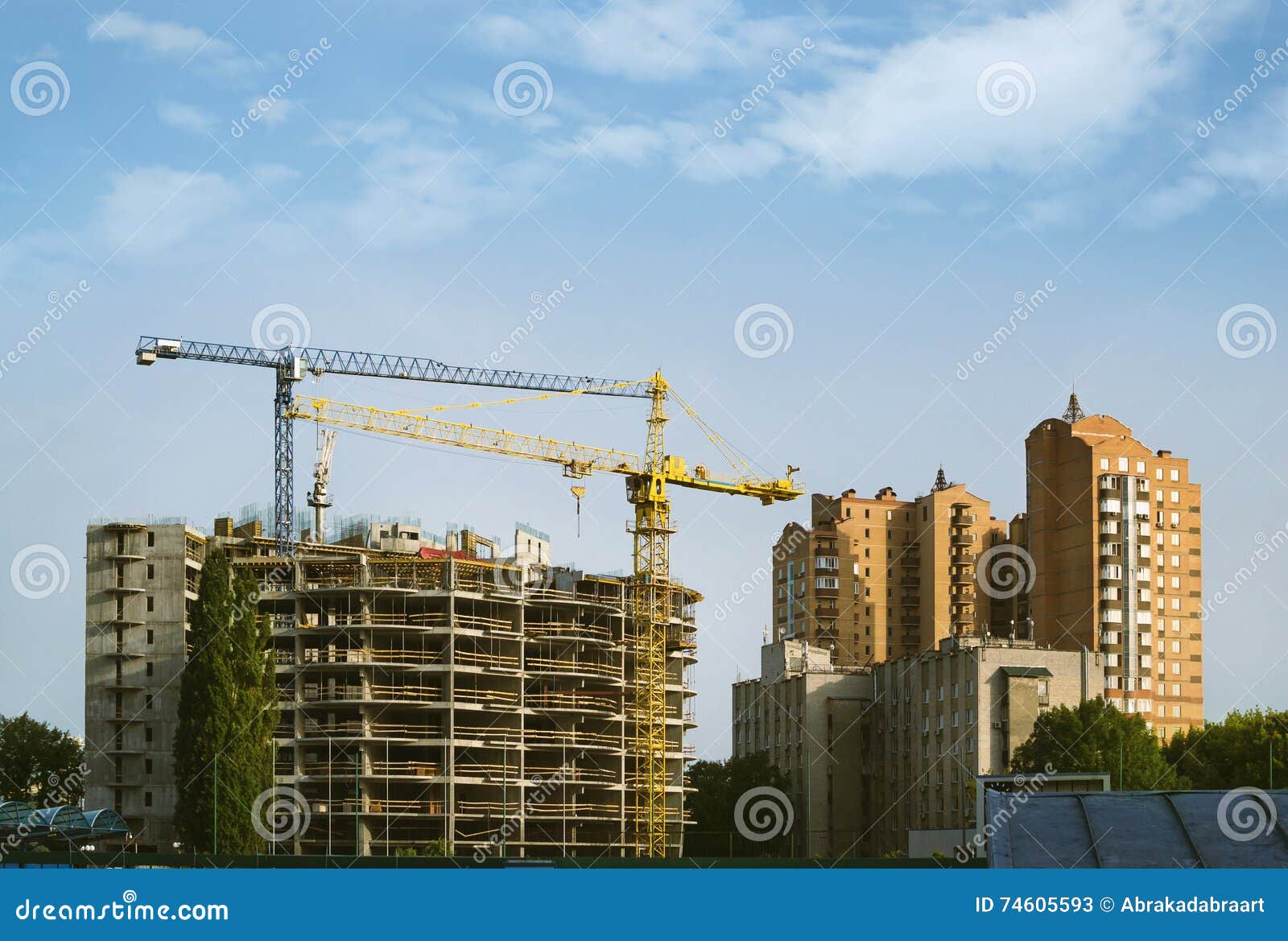 Construction Building with Hoisting Tower Crane Stock Image - Image of ...