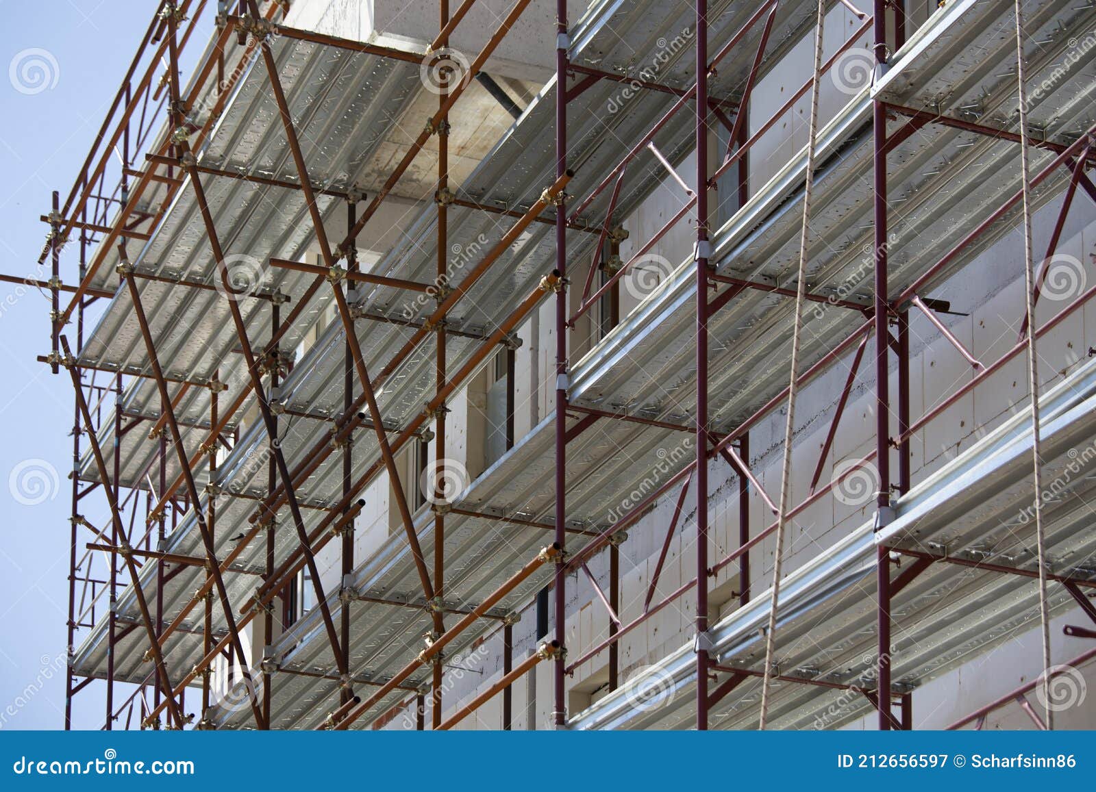 Construction of a building stock image. Image of scaffolding - 212656597